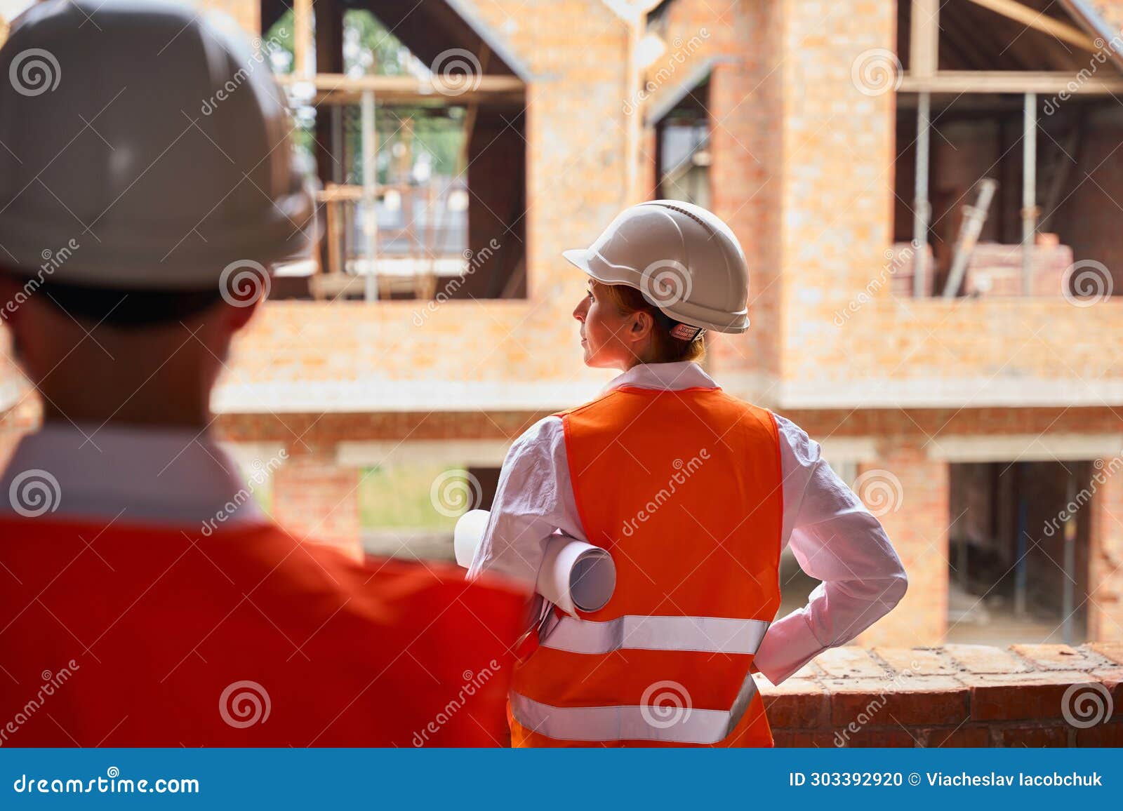 Team of Construction Professionals Conducting Development Site ...