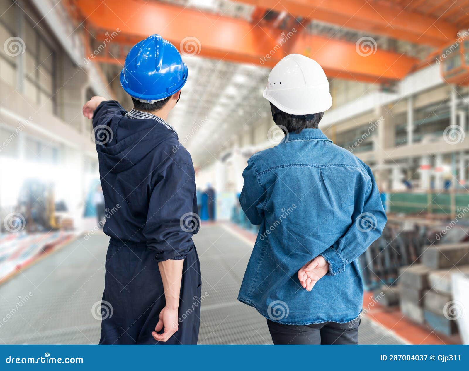 A Team of Construction Workers with Helmets at Work Place Stock Image ...