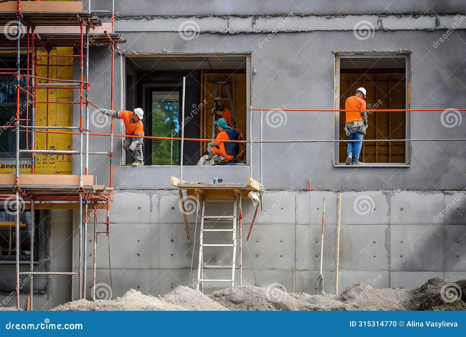 Team of the Construction Workers Works on Foundation of Contemporary ...