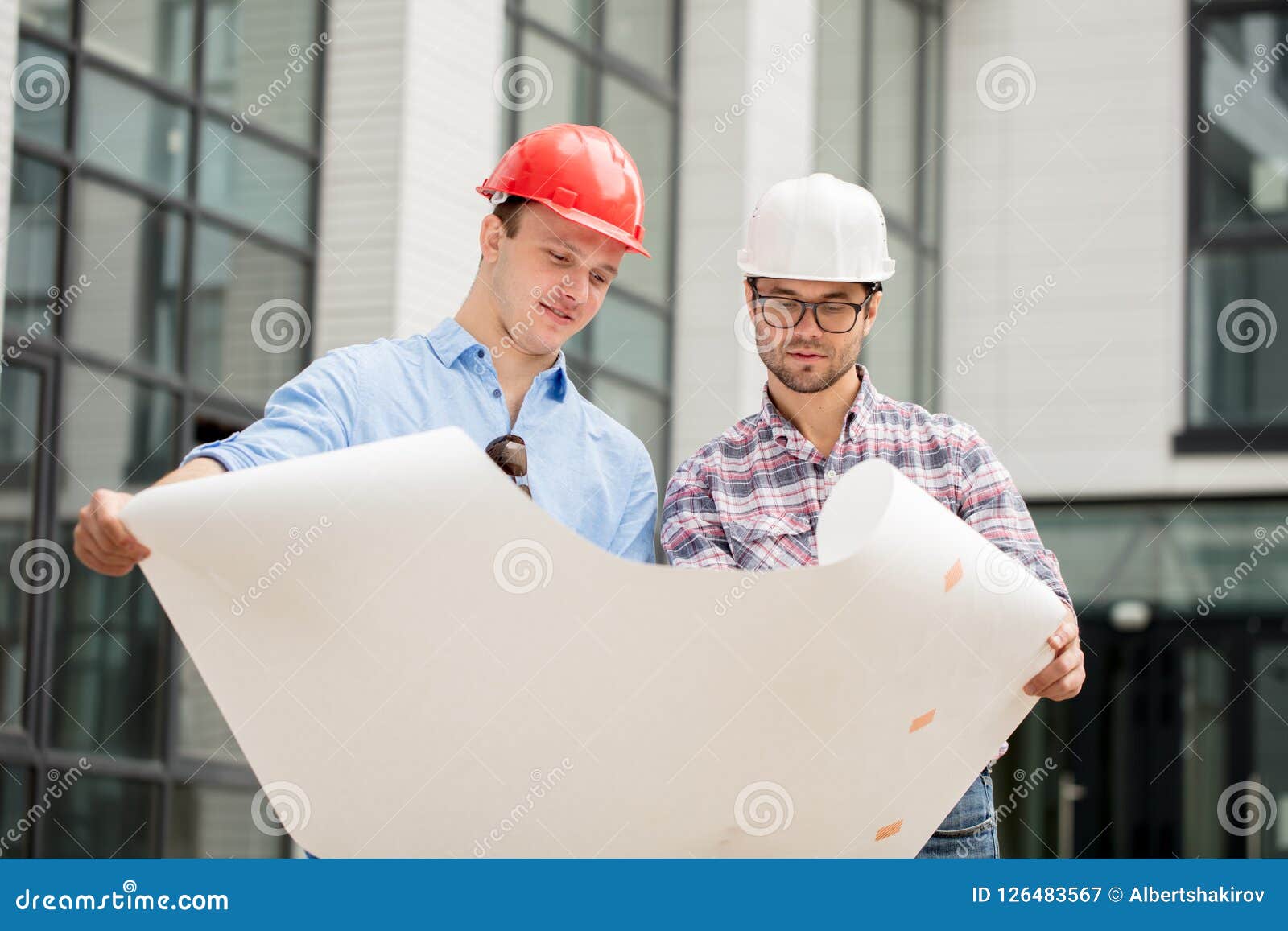 Team of Constructors are Working According the Plan and Scheme Stock ...