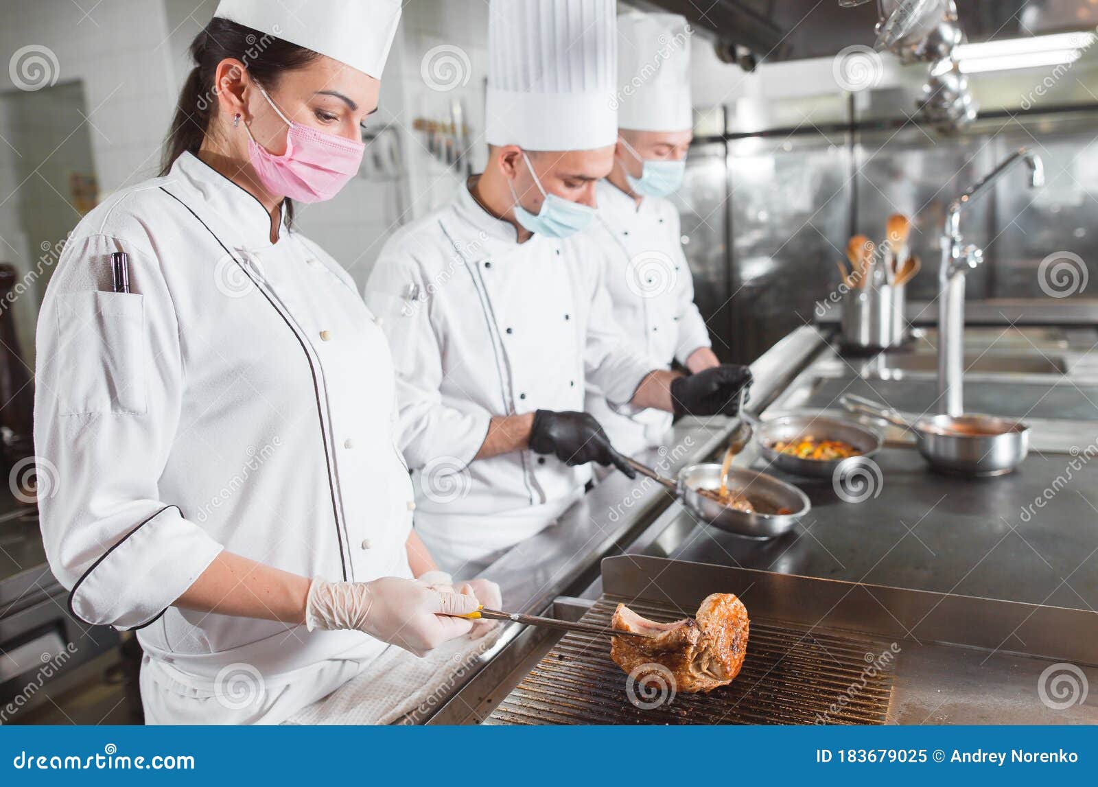 Team of Cooks Cooks in a Restaurant Stock Image - Image of cooks, dish ...