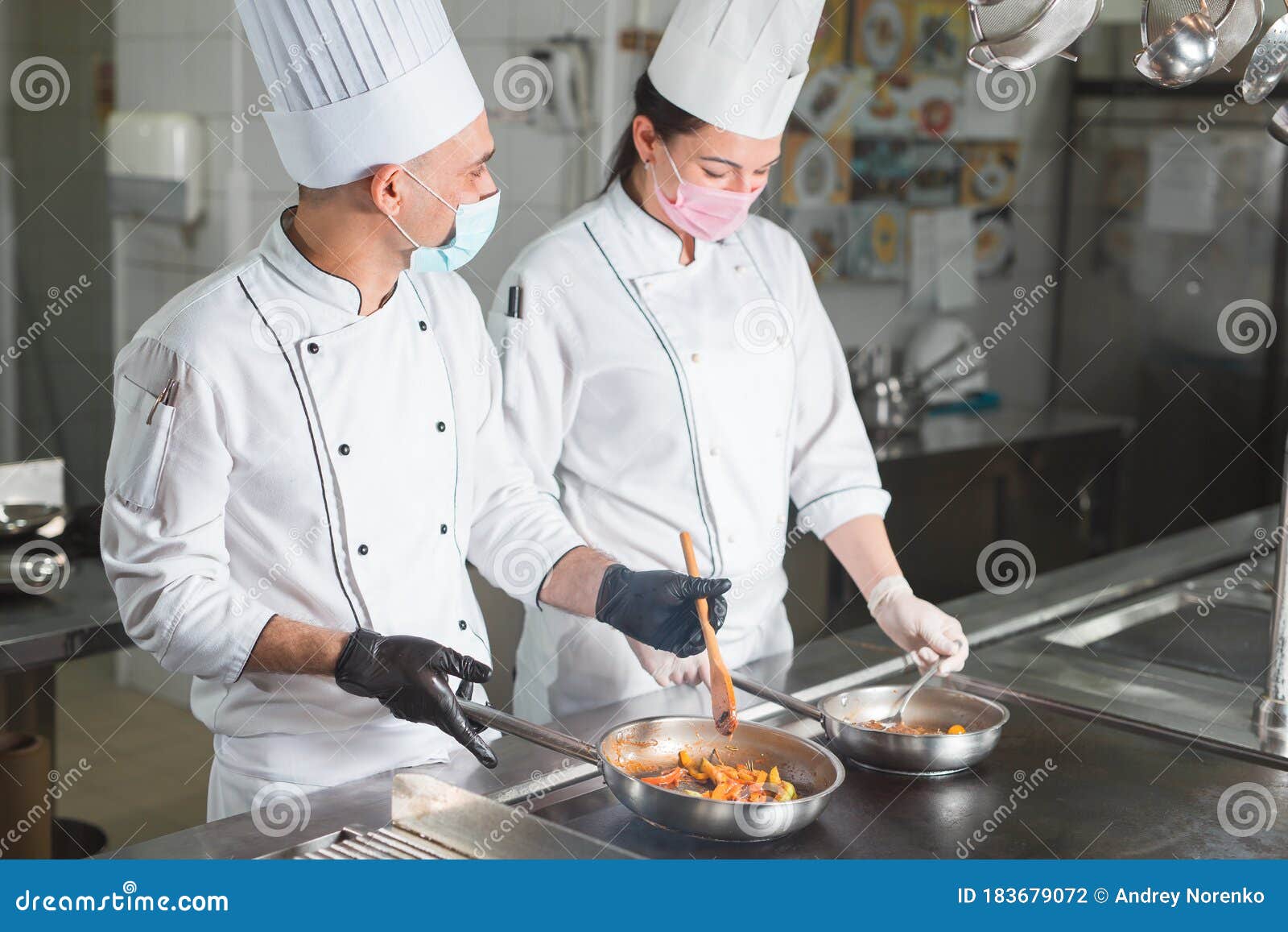 Team of Cooks Cooks in a Restaurant Stock Photo - Image of covid19 ...