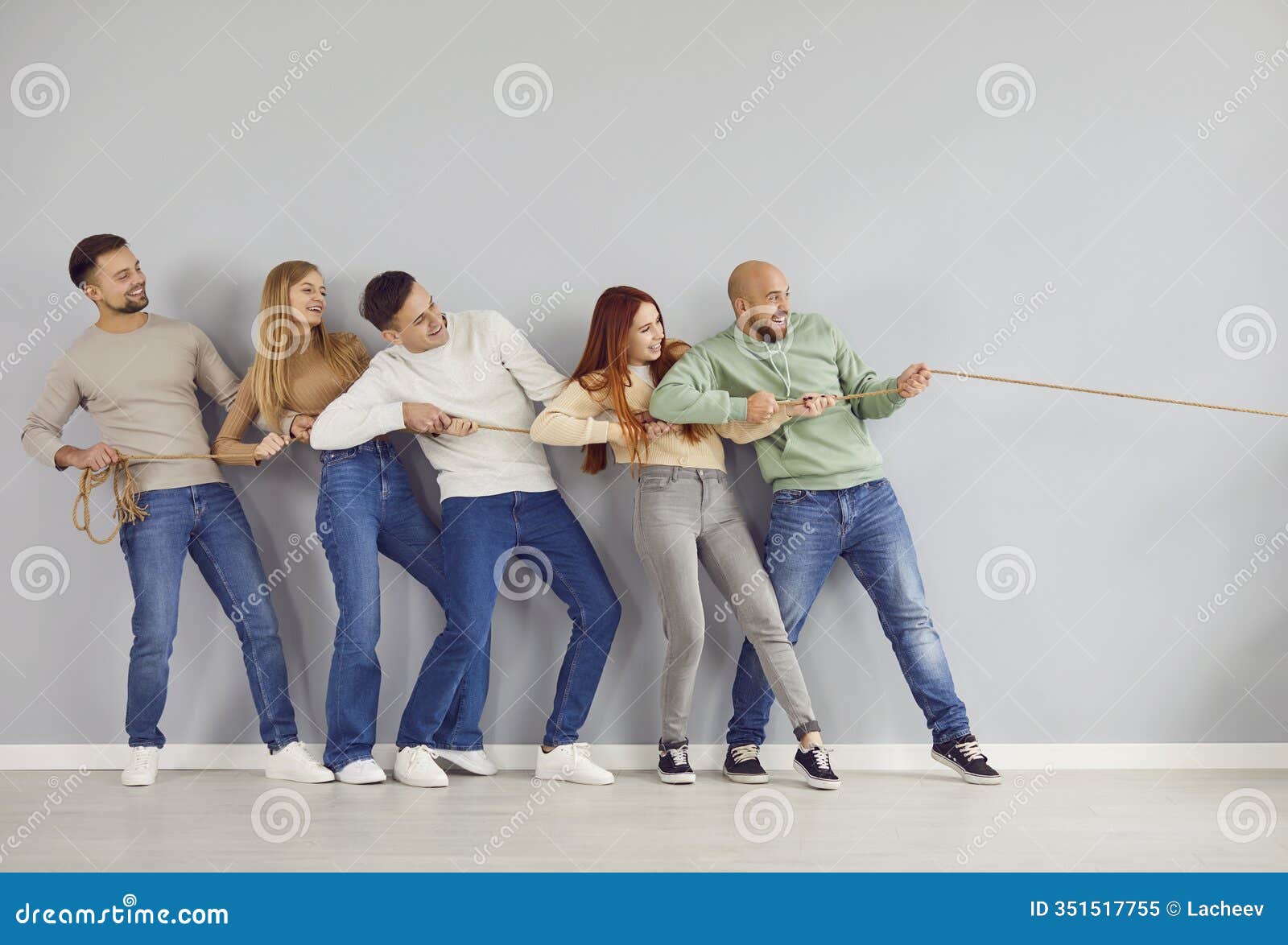 Coworkers Pulling Rope on Gray Background Stock Image - Image of ...