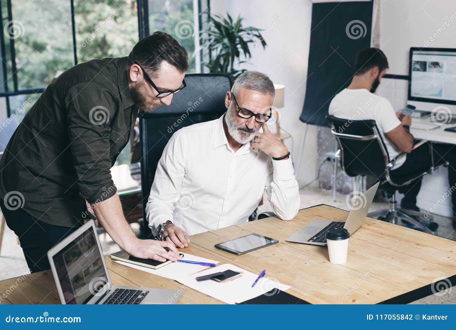 Team of Coworkers Making Great Work Discussion in Modern Office ...