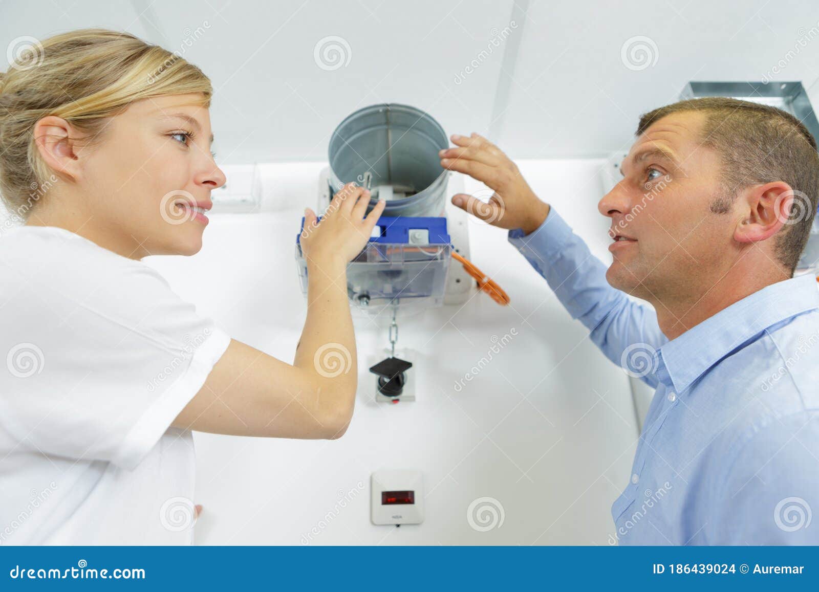 Team Coworkers Working on Air Conducts Stock Photo - Image of office ...