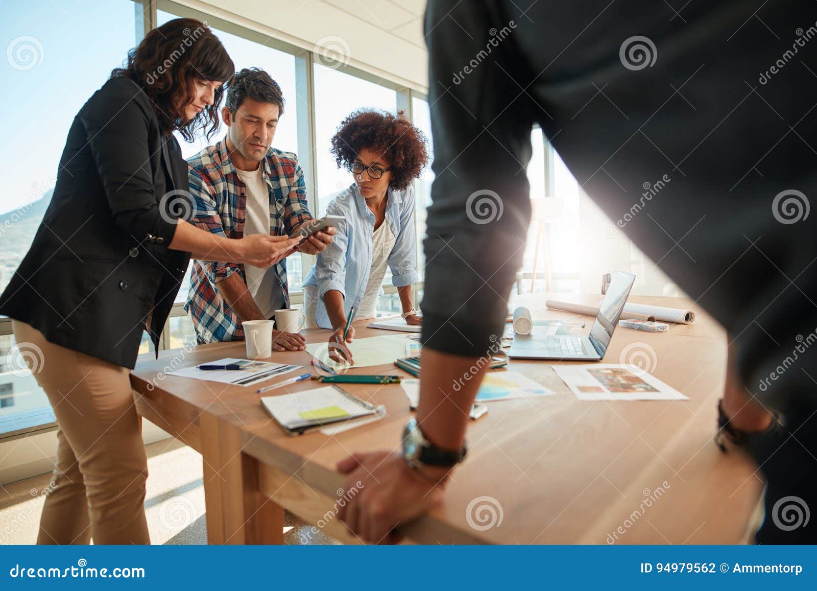 Team of Creative Professionals Working on New Project Stock Photo ...