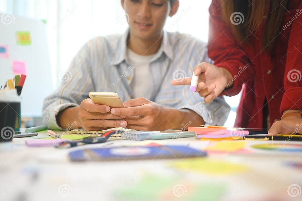 Team of Creatives Collaborating on a UX UI Project at Workspace Filled ...