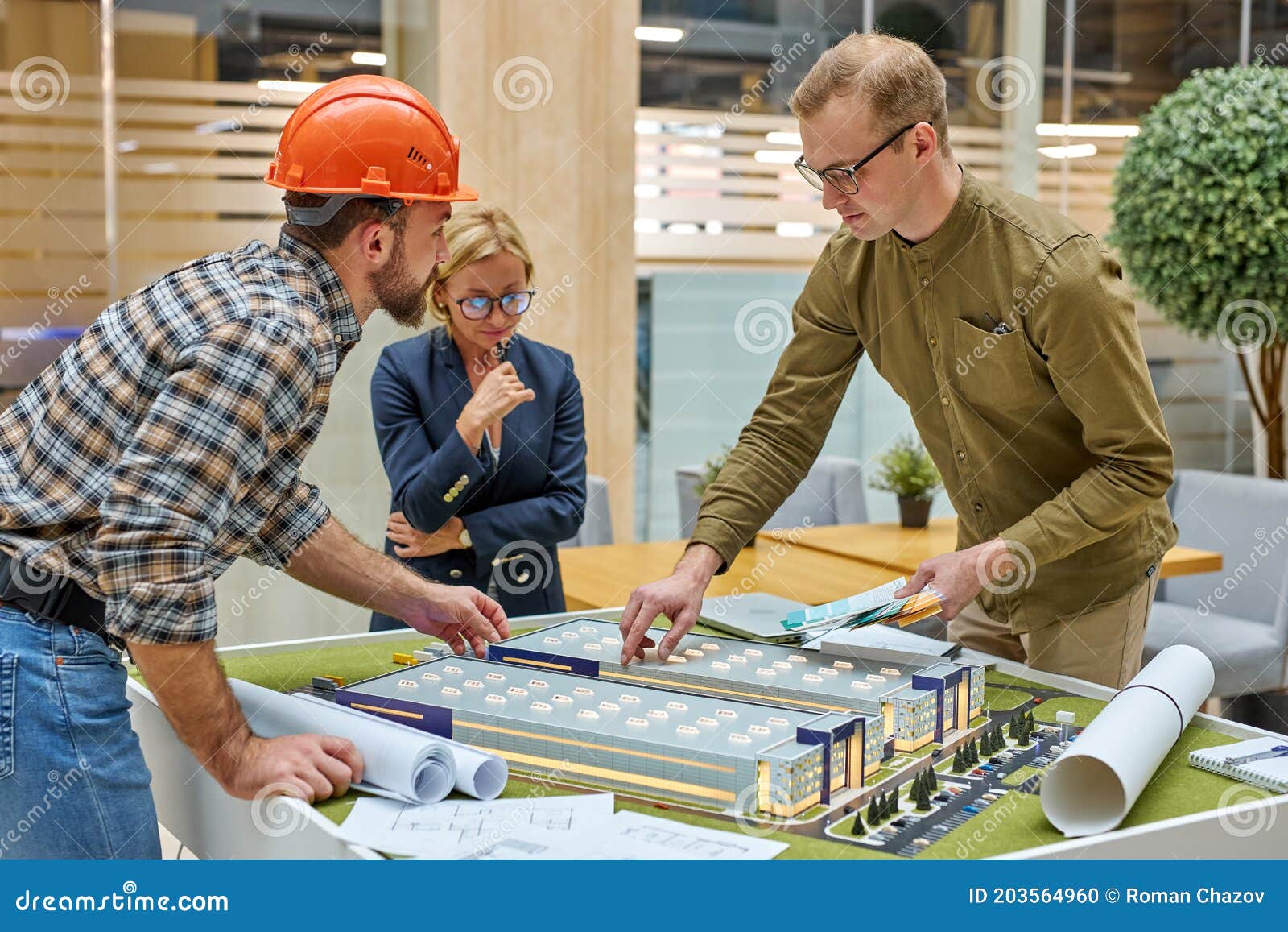 Team of 3d Architects Working in Office with Building 3d Model Stock ...
