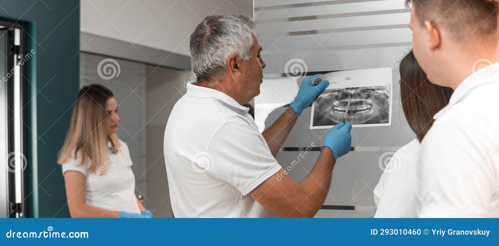 A Team of Dentists Study X-ray Scans, MRI Scans of Oral Teeth, Discuss ...