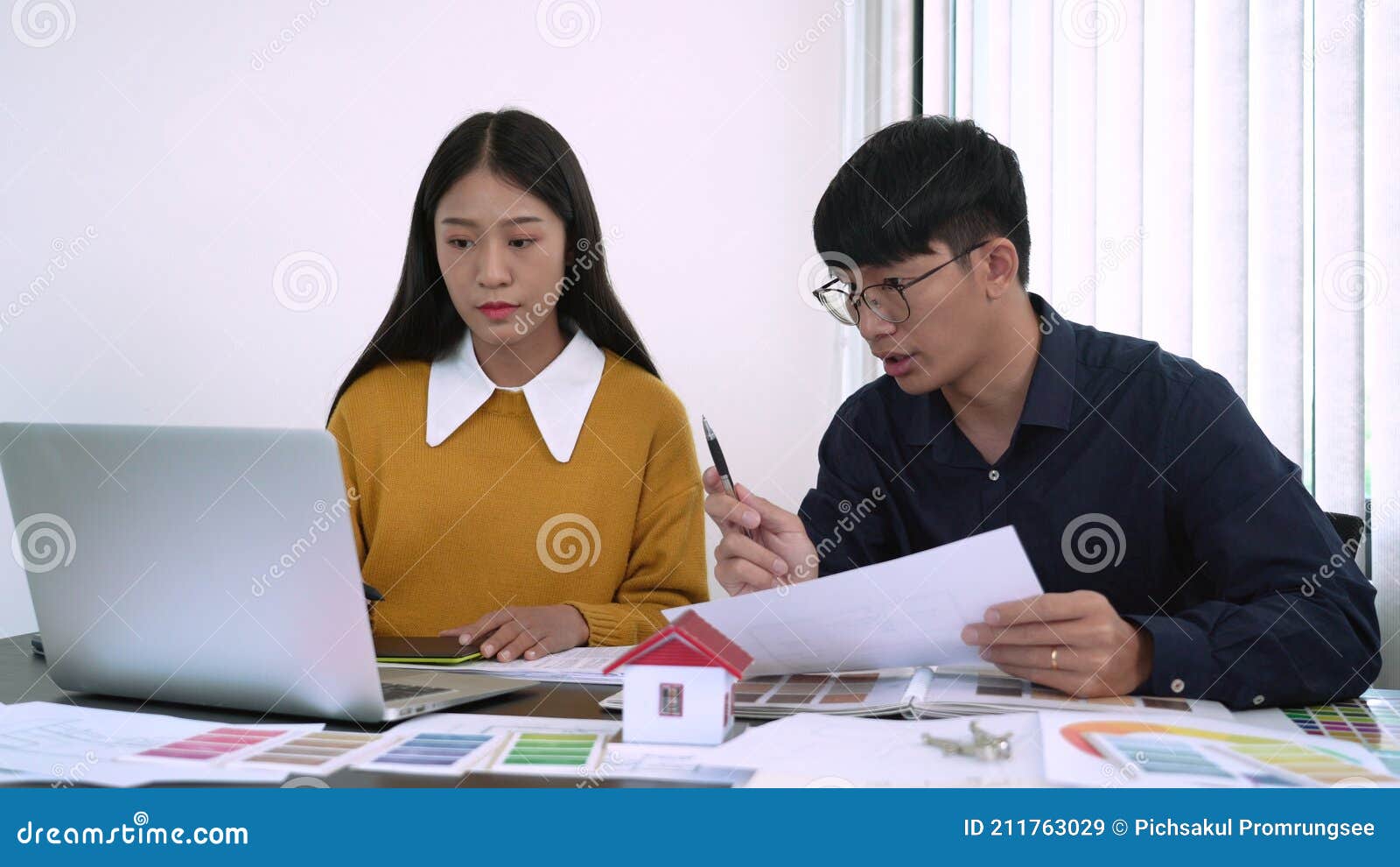 Team Designer Working Graphic with Color Chart on New Project with Work ...