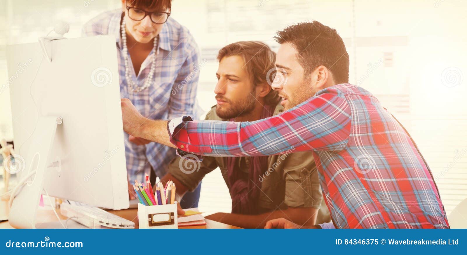 Team of Designers Working on a Computer Stock Image - Image of ...