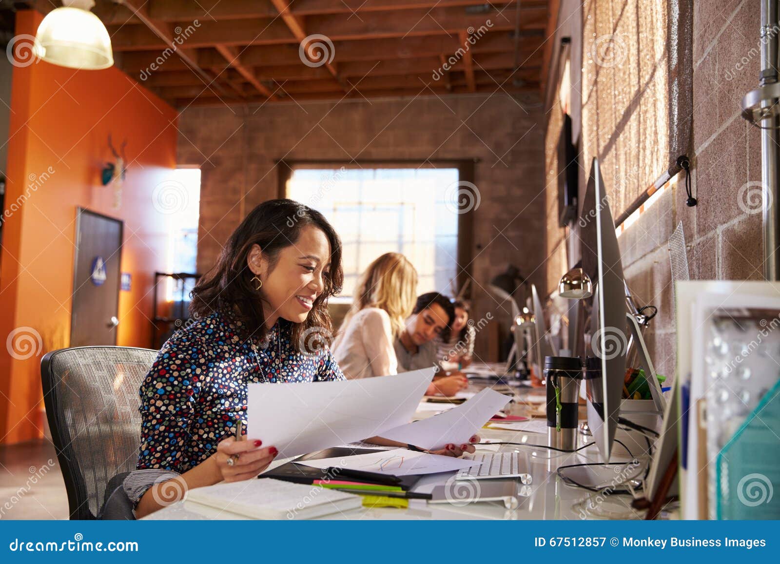 Team of Designers Working at Desks in Modern Office Stock Image - Image ...