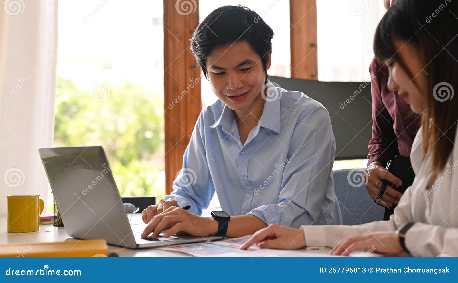 Team of Developer Sharing Idea and Discussing Over Software Design ...