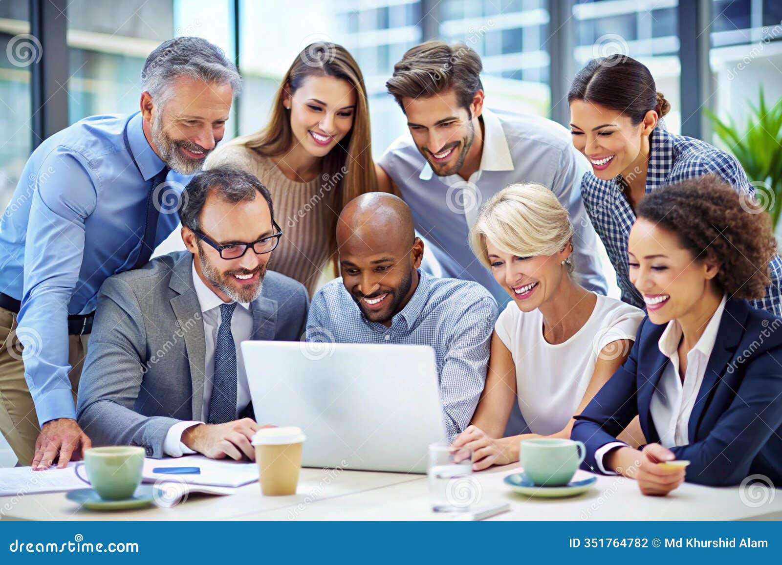 Team of Diverse Professionals Collaborating on a Project, Showcasing ...