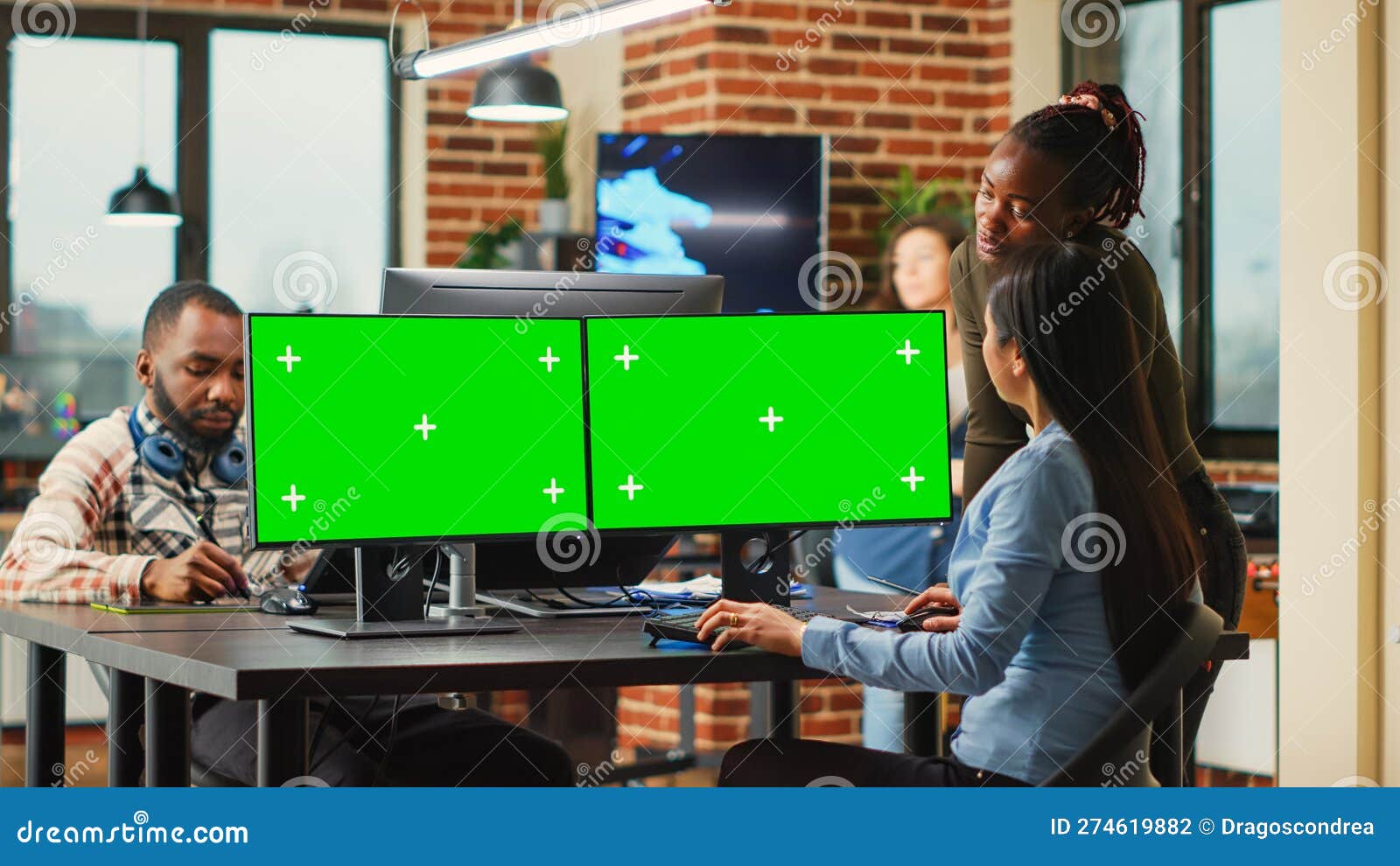 Team of Diverse Workers Analyzing Computers with Greenscreen Template ...