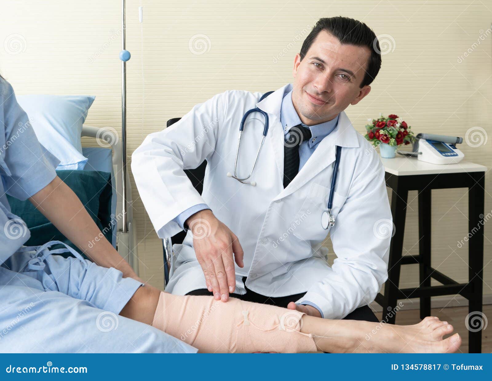 Team of Doctor Examining a Female Patient Stock Image - Image of people ... Team of Doctor Examining a Female Patient Stock Image - Image of people ...