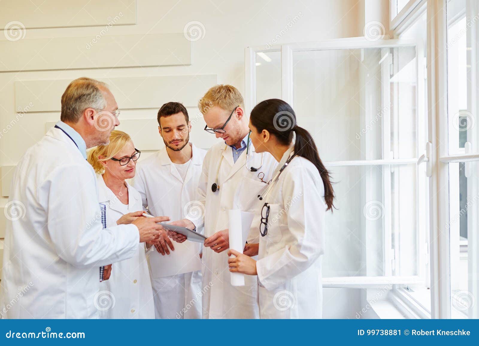 Team of Doctors Cooperating Stock Image - Image of senior, colleagues ...