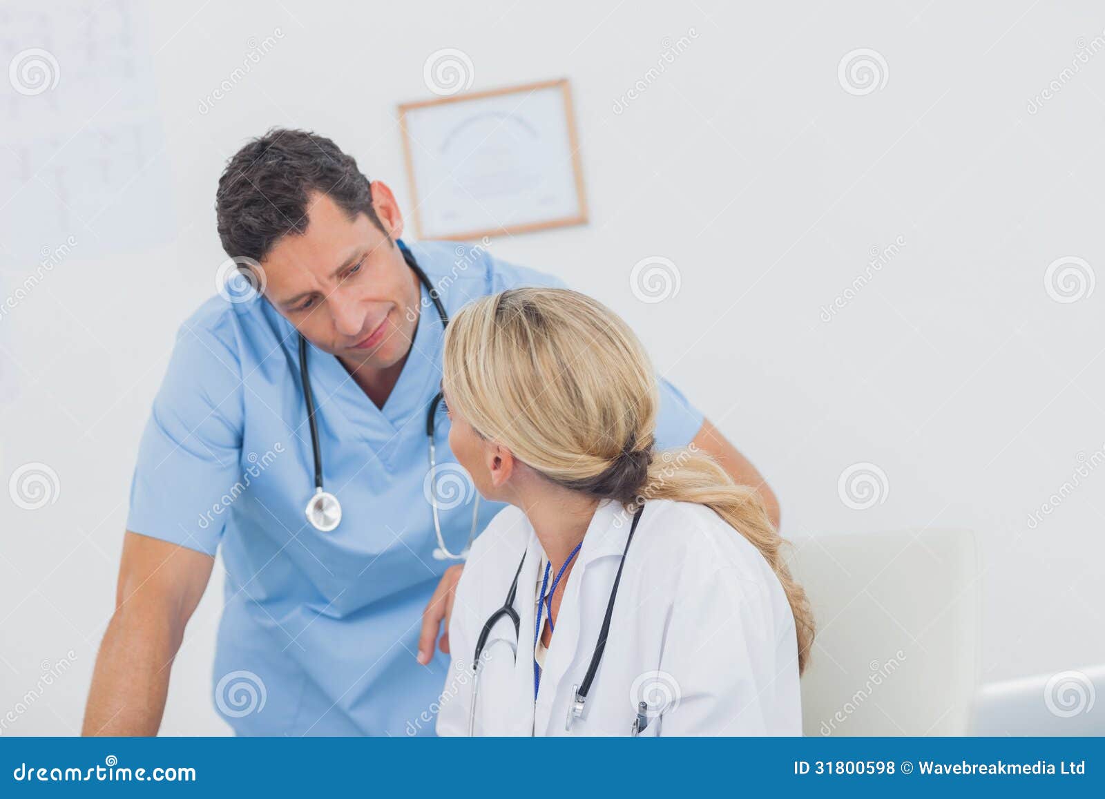 Team of Doctors Discussing Each Other Stock Photo - Image of ...