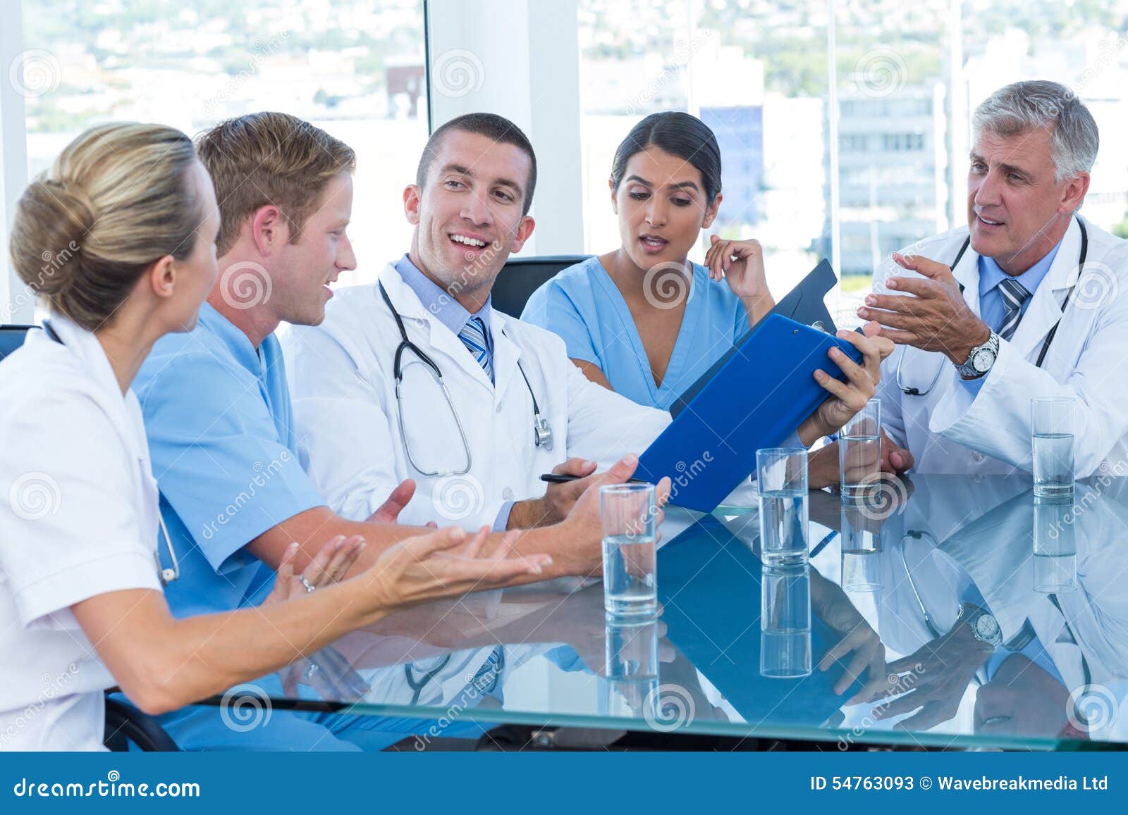 Team of Doctors Discussing about File Stock Image - Image of expertise ...