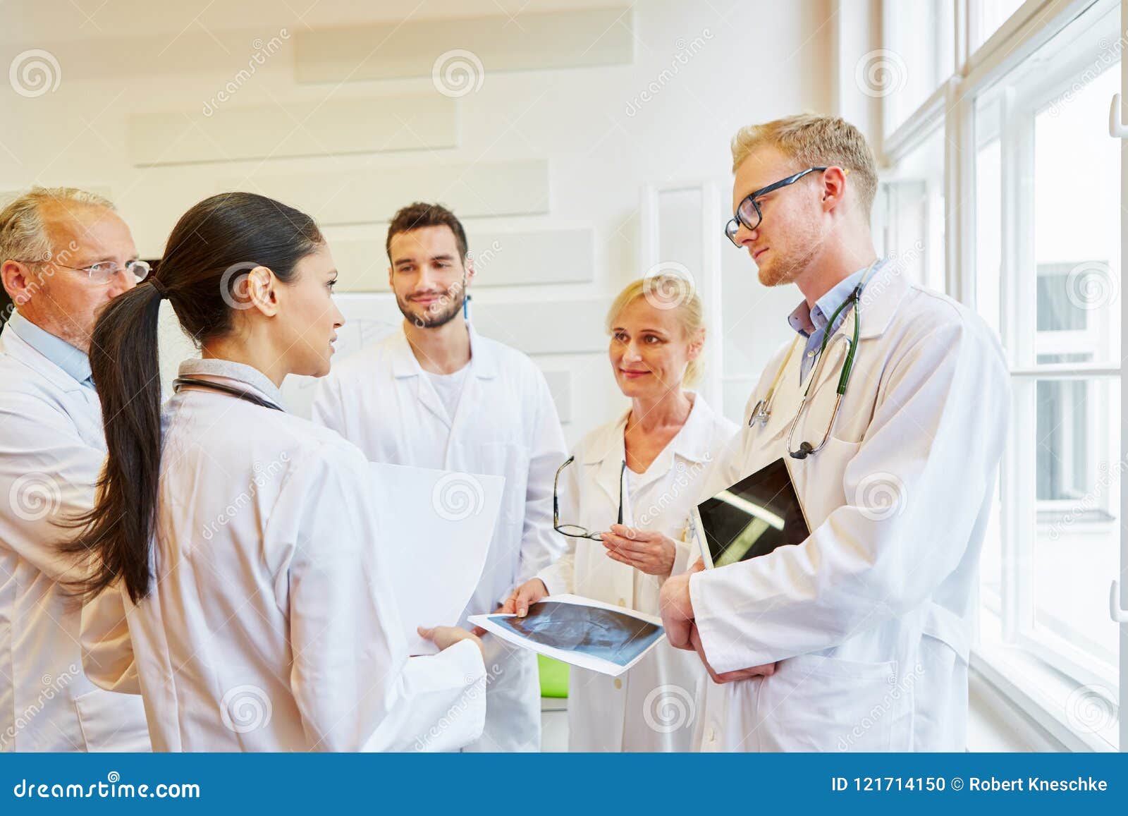 Team of Doctors in Discussion Stock Photo - Image of hospital, medicine ...