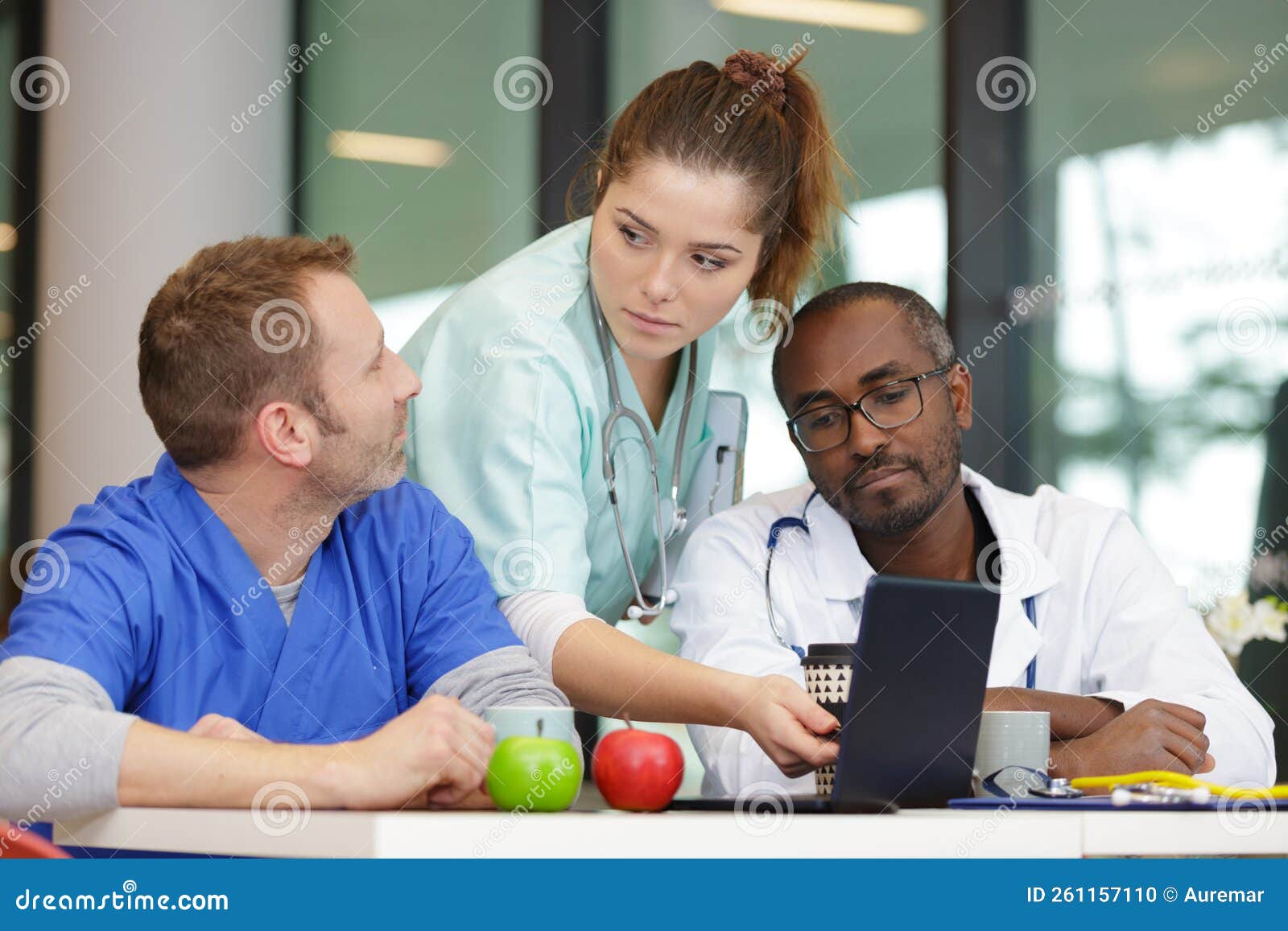 Team doctors having lunch stock photo. Image of specialist - 261157110