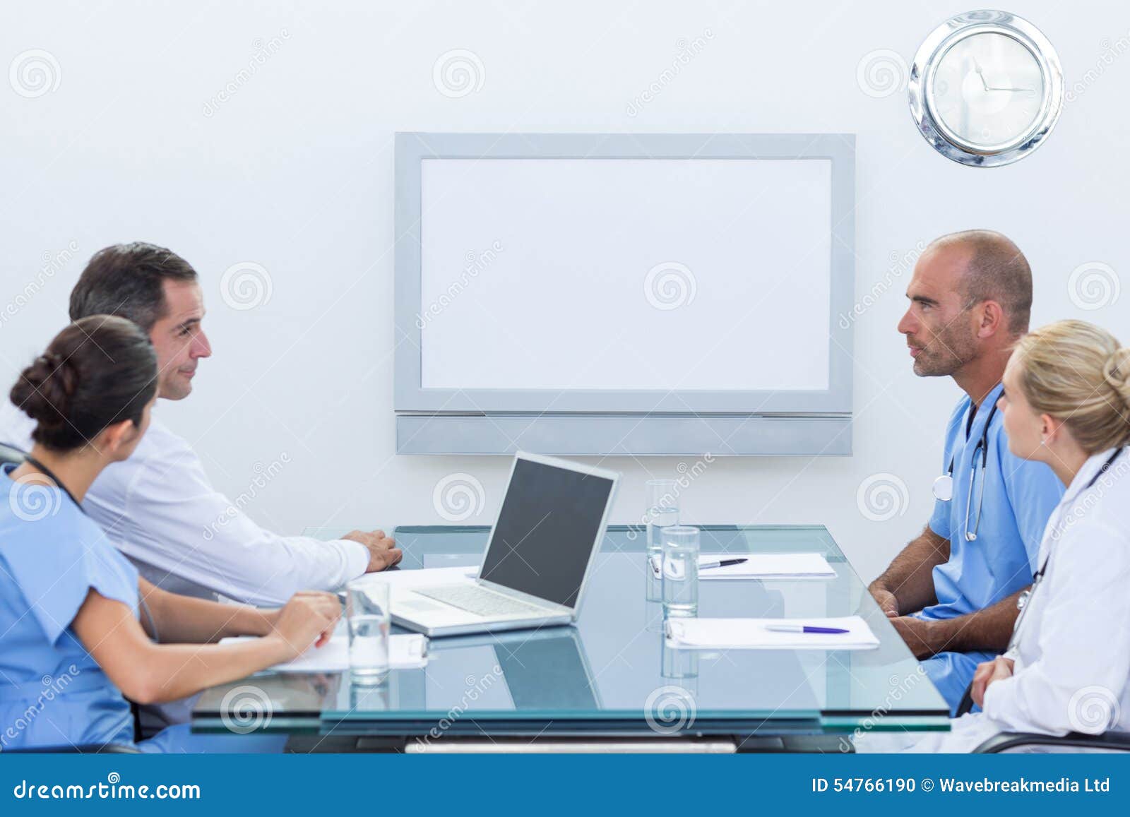 Team of Doctors Having a Meeting Stock Photo - Image of room, coat ...