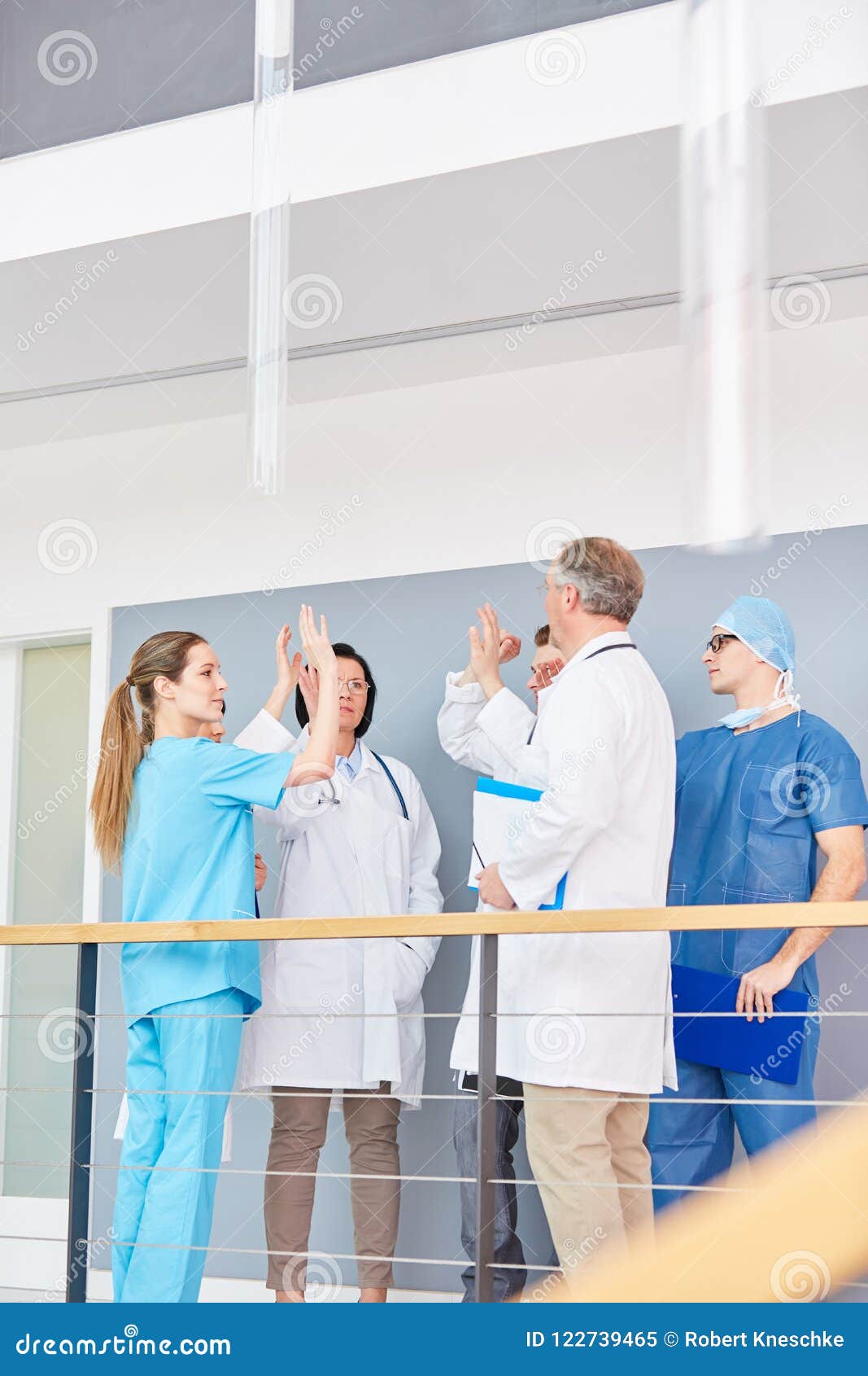 Team of doctors High Five stock image. Image of care - 122739465