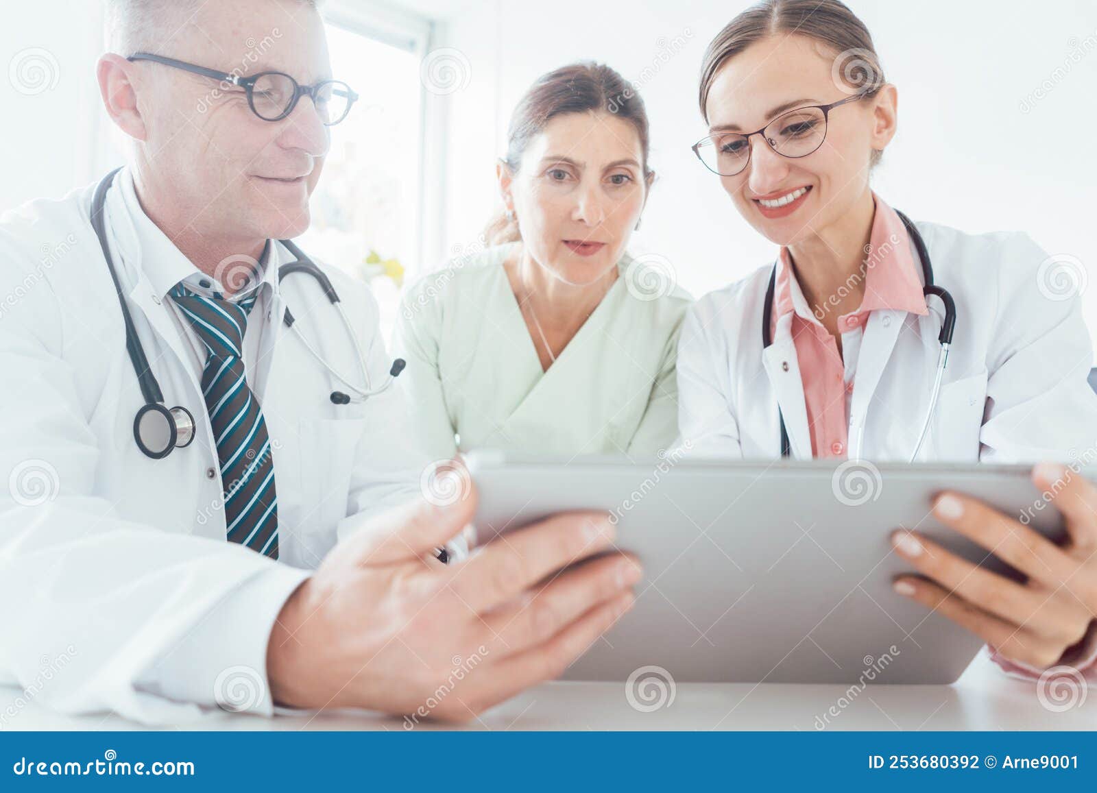 Team of Doctors in Meeting Discussing a Case Stock Photo - Image of ...