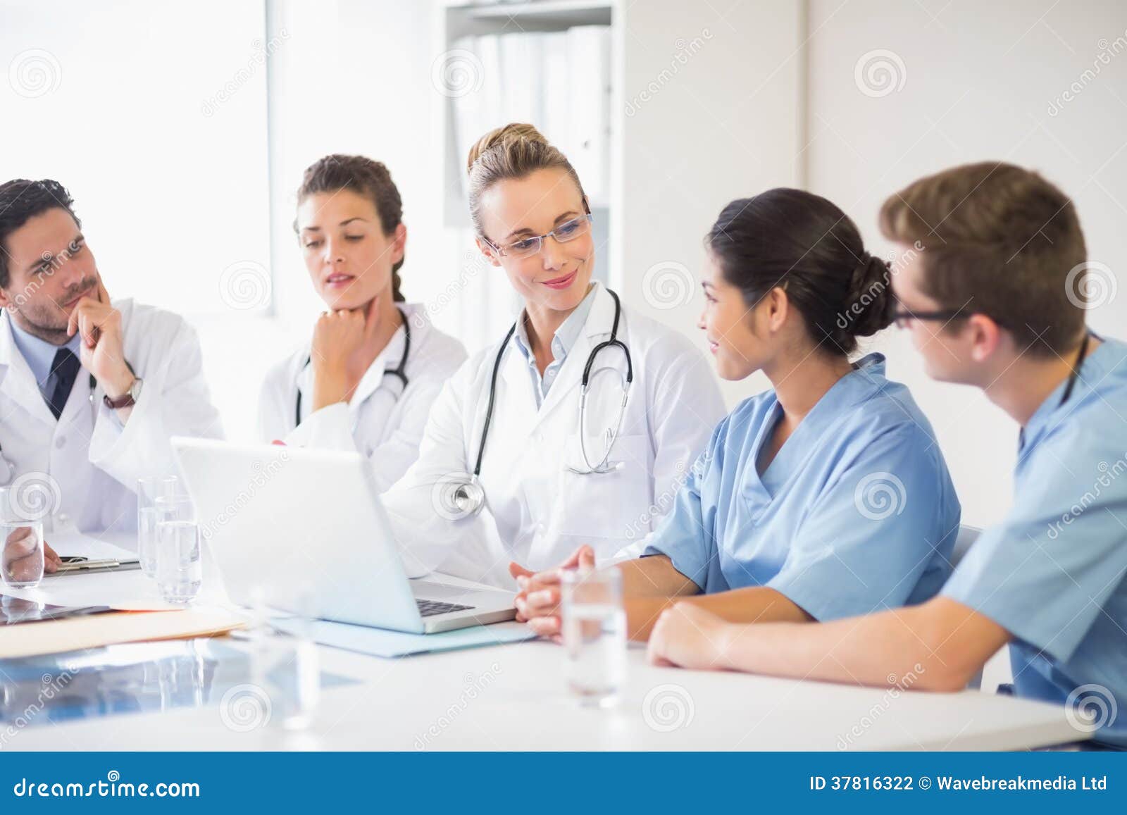 Team of Doctors and Nurses Discussing Stock Photo - Image of female ...