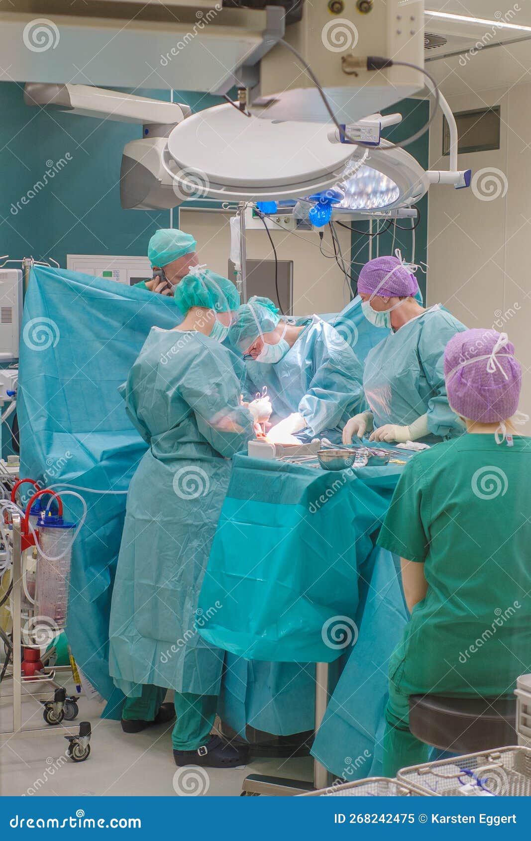 Team of Doctors and Nurses Operate on a Patient Editorial Image - Image ...