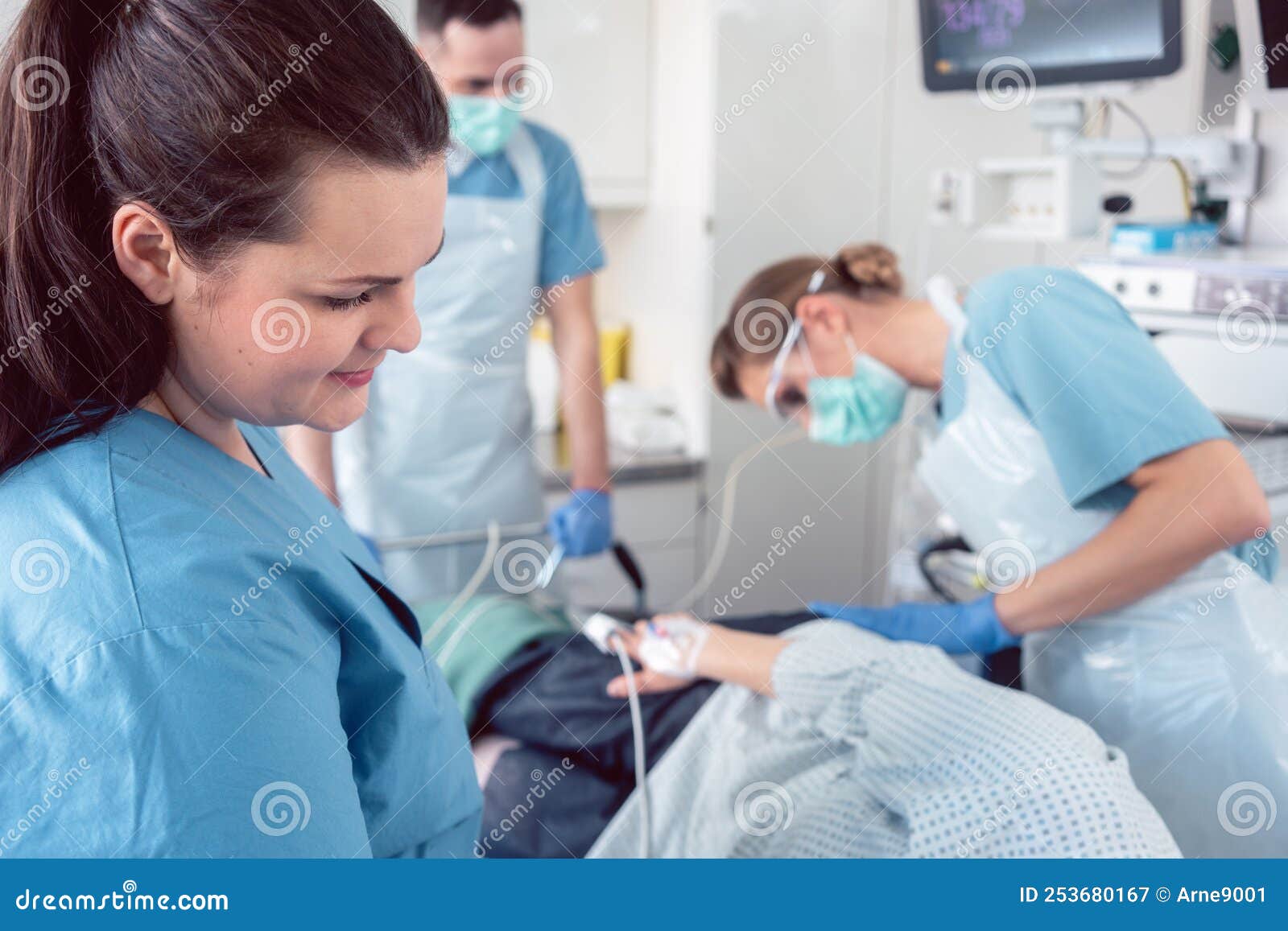Team of Doctors and Nurses Performing Colonoscopy Stock Image - Image ...