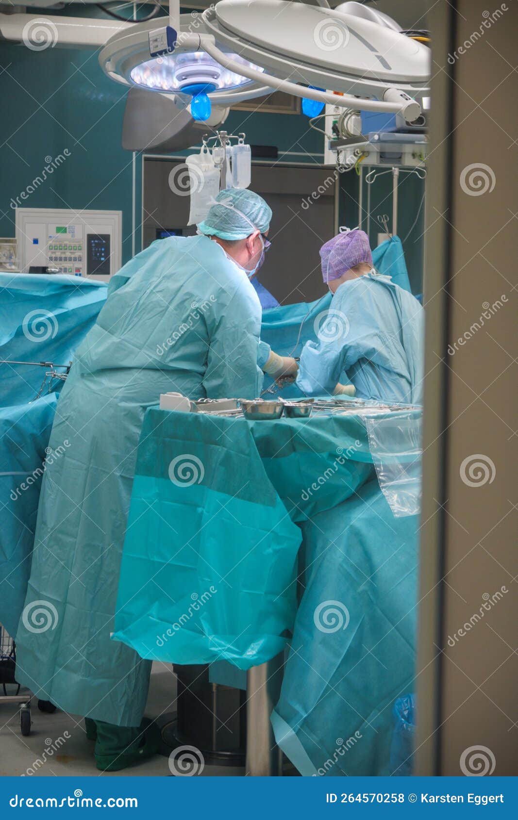 A Team of Doctors Performs an Operation in a Clinic Stock Photo - Image ...