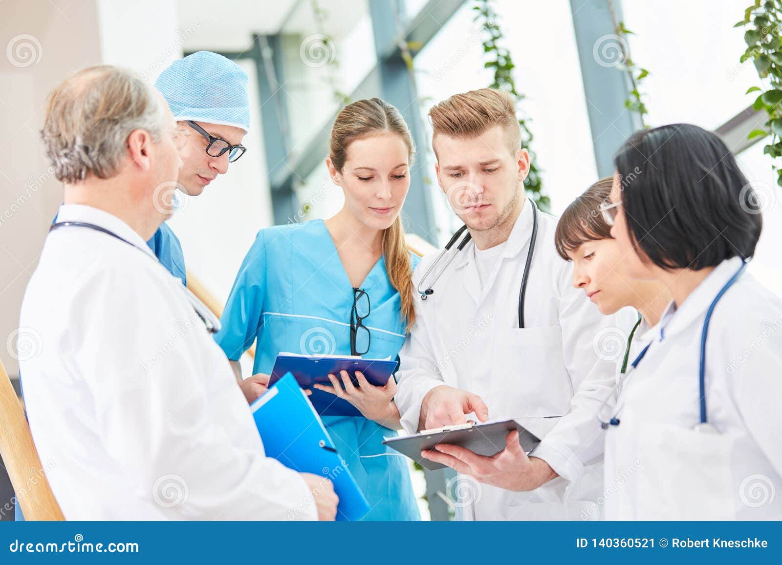 Team of Doctors Planning Surgery Stock Image - Image of surgeon ...