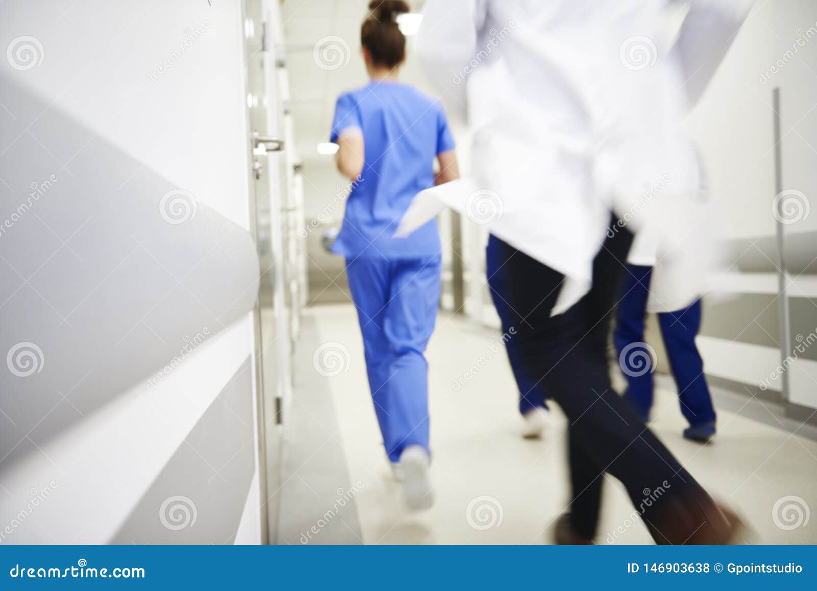 Team of Doctors Running in a Hurry Stock Photo - Image of corridor ...