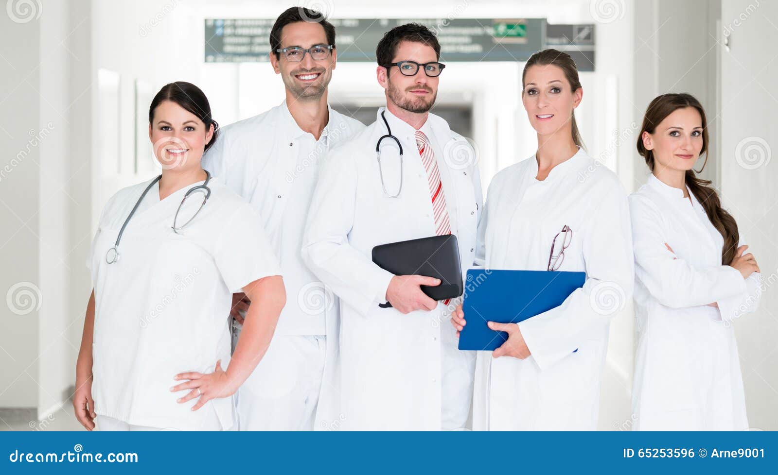 Team of Doctors Standing in Hospital Corridor Stock Photo - Image of ...