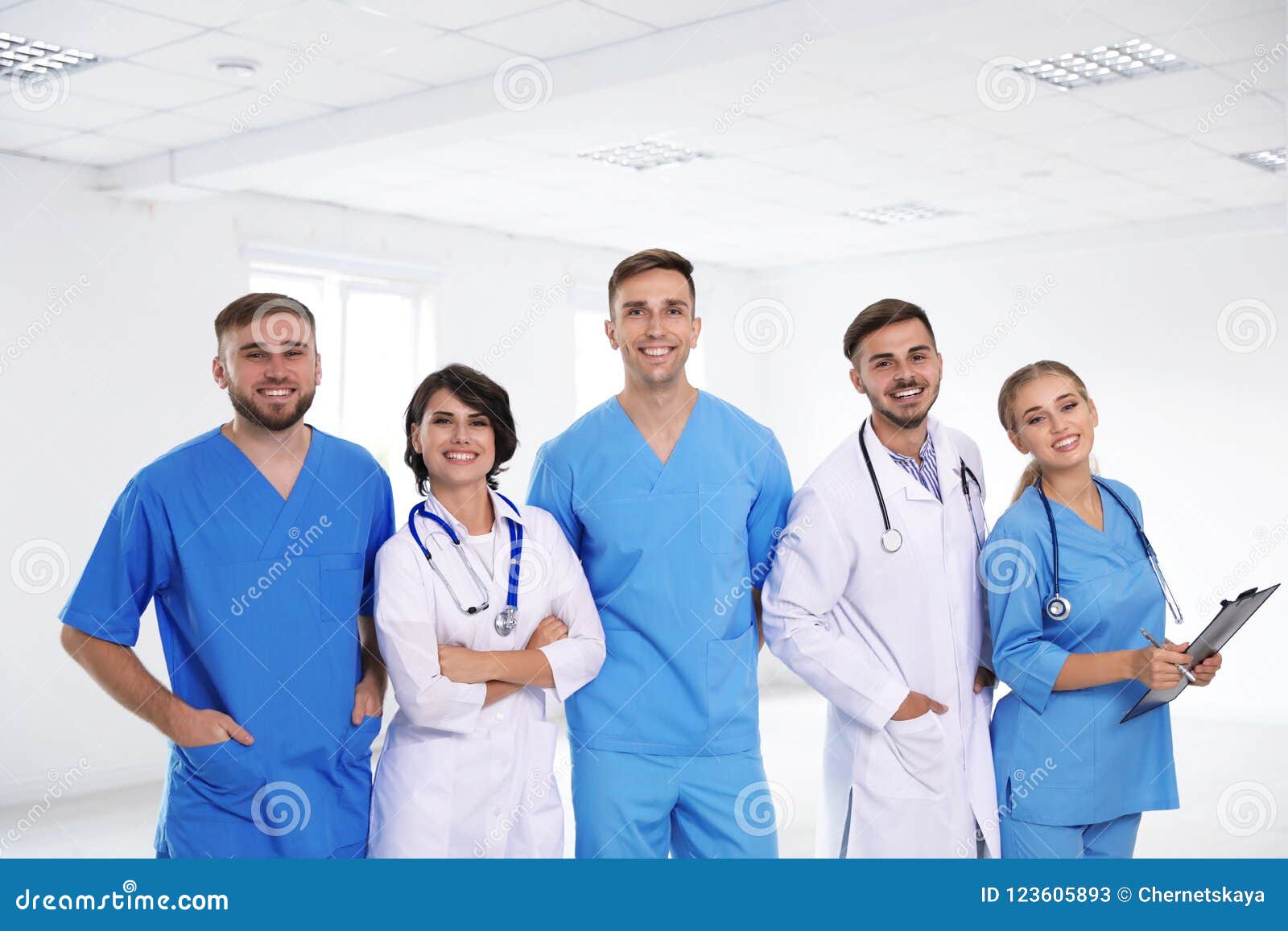 Team of doctors in uniform stock image. Image of medicine - 123605893