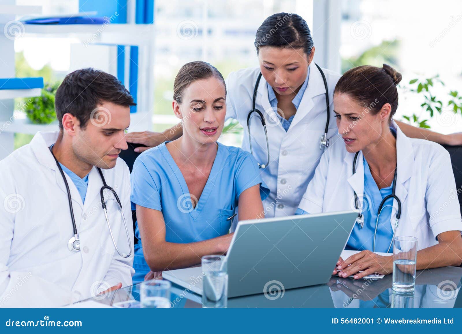 Team of Doctors Working on Laptop Stock Image - Image of male ...