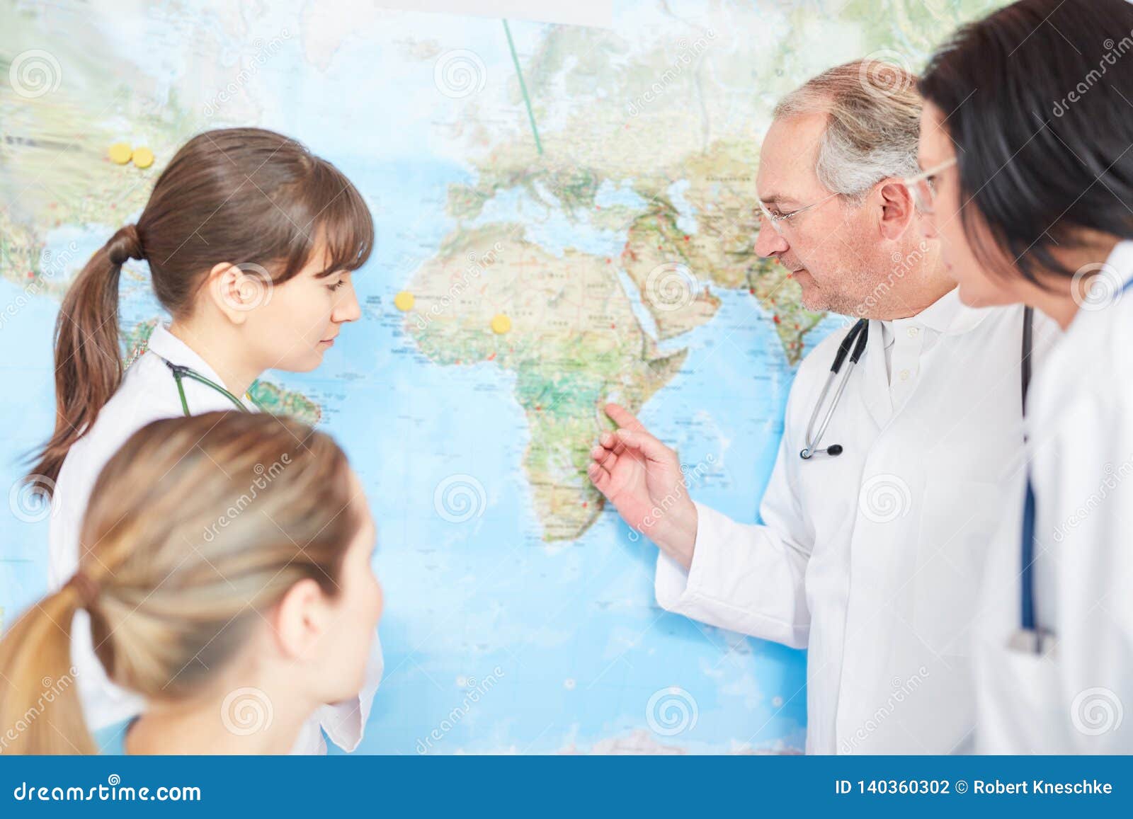 Team of Doctors with World Map Stock Photo - Image of staff, nurse ...