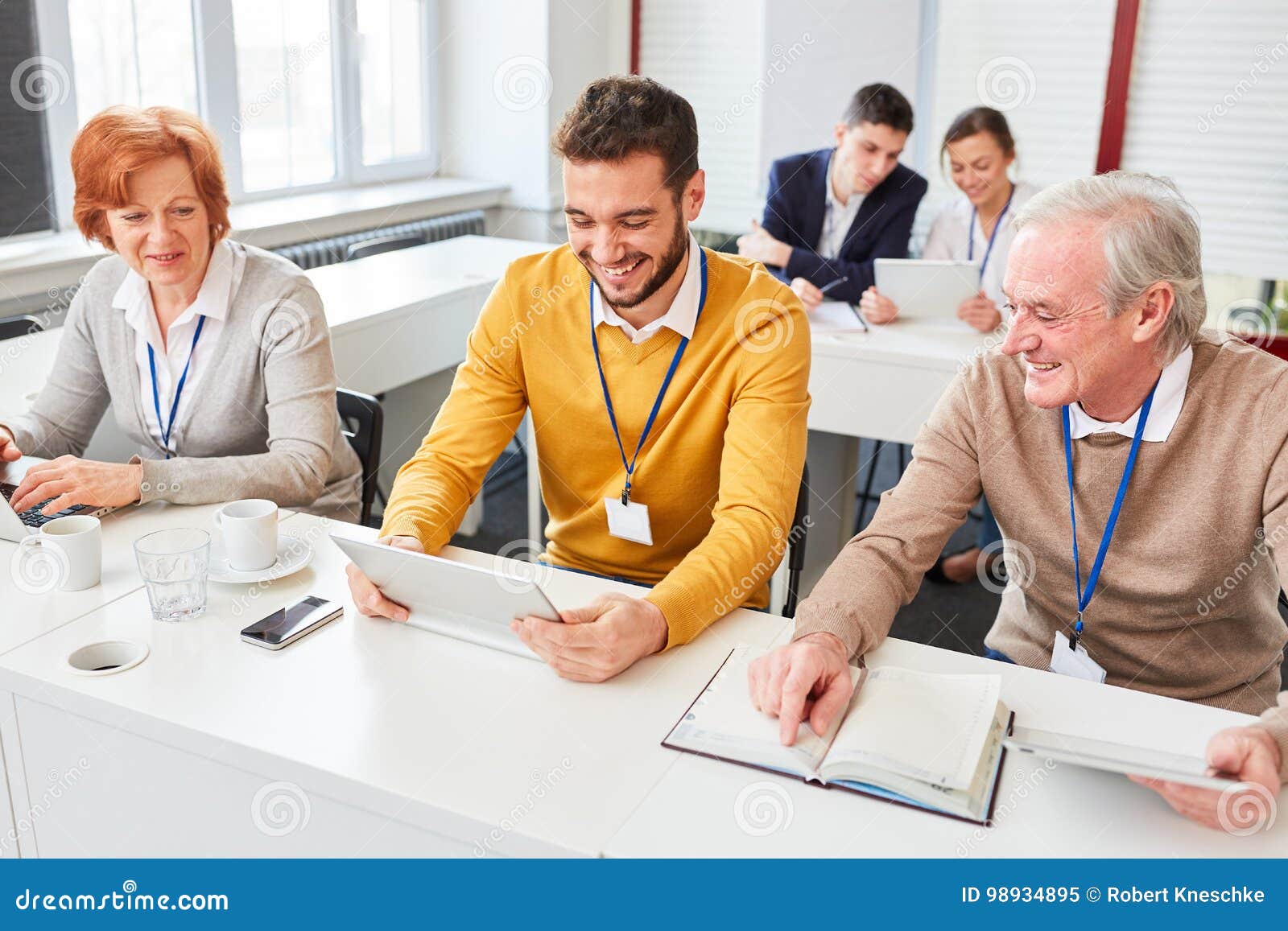 Team in e-learning seminar stock image. Image of senior - 98934895
