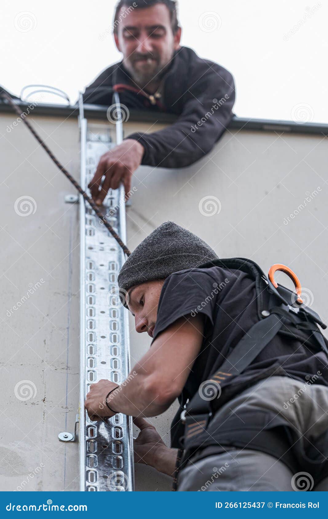 Team of Electrical Engineers Install the Electrical Cables for the ...