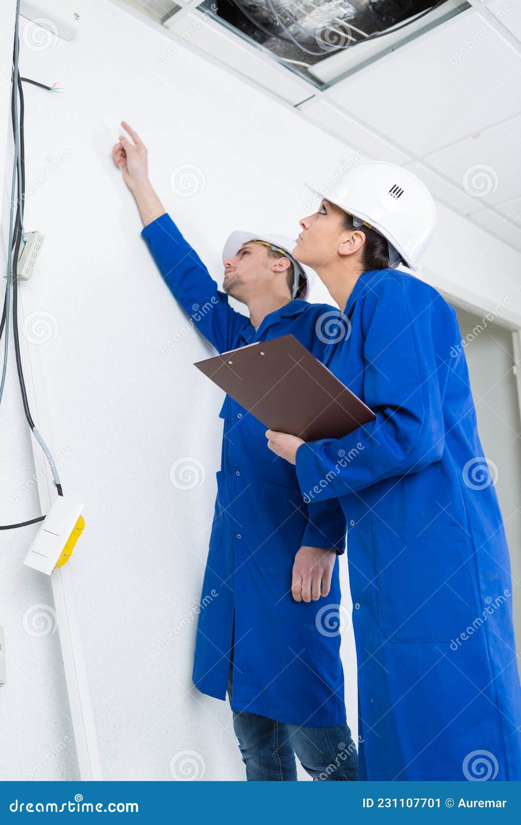 Team Electricians Working at Construction Site Stock Image - Image of ...