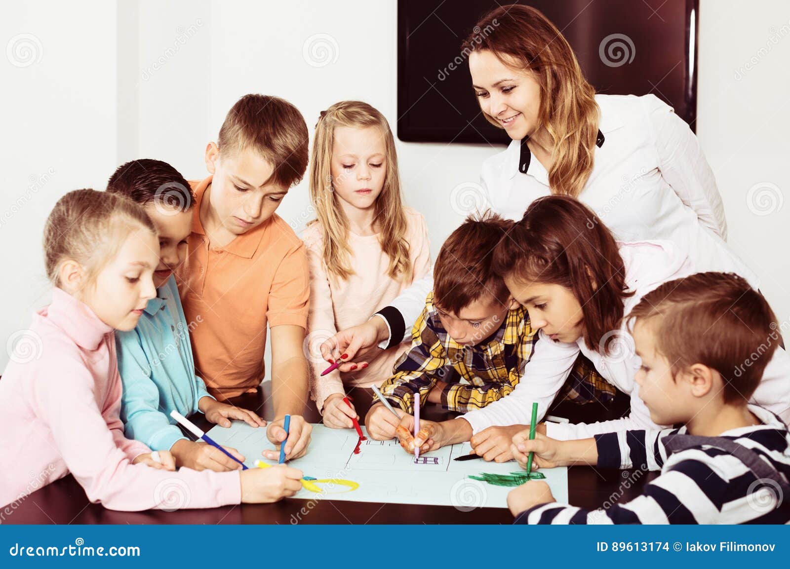 Team of Elementary Age Children Drawing Stock Photo - Image of sketch ...