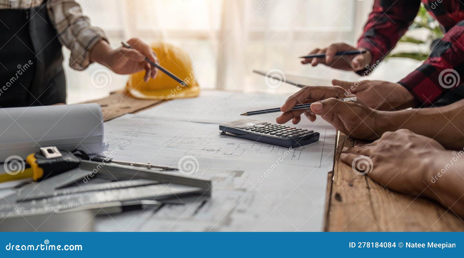 Team Engineer Checks Construction Blueprints on New Project with ...