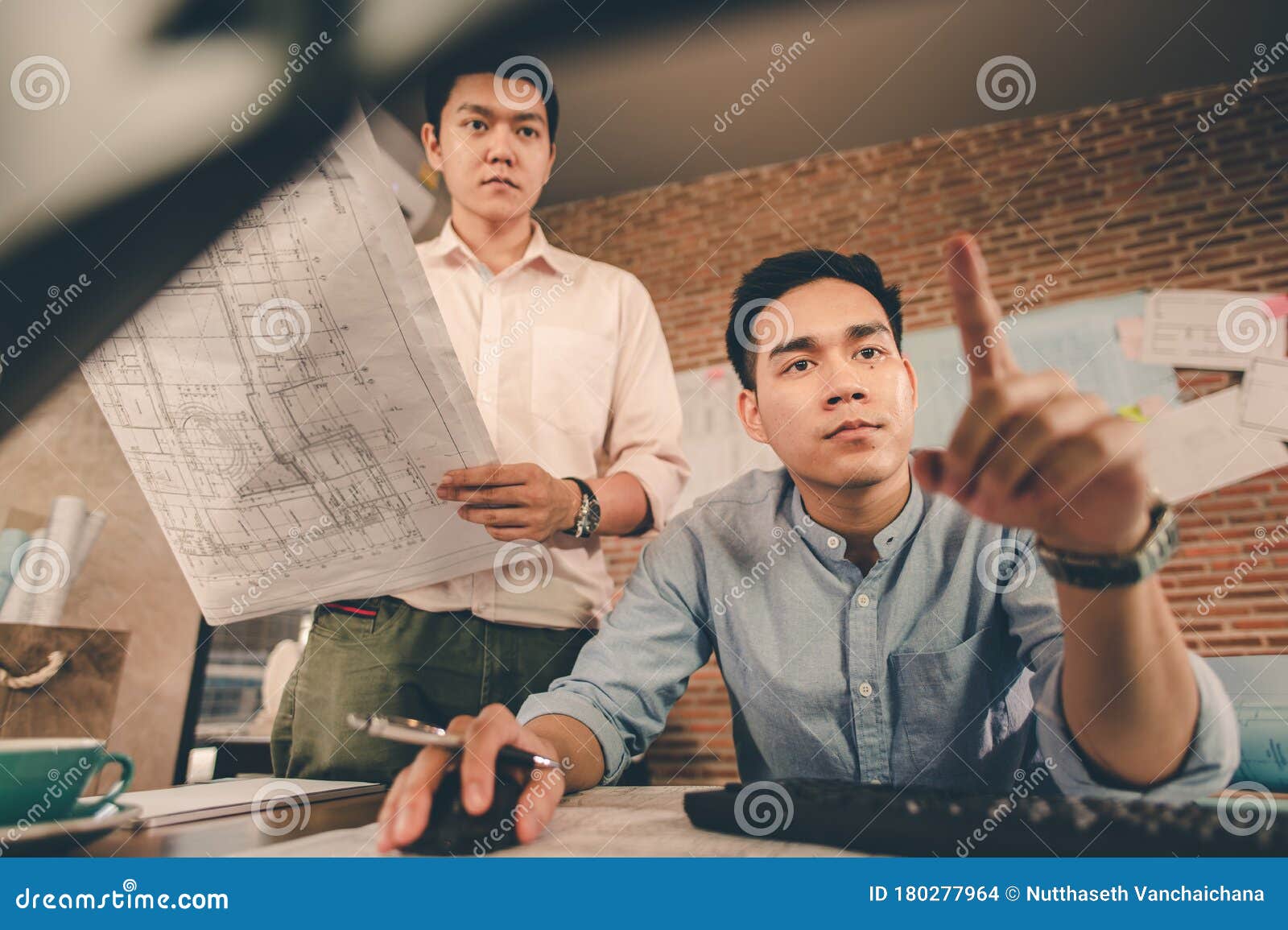 Team of Engineer Discussing of Construction Plan about the House Plan ...