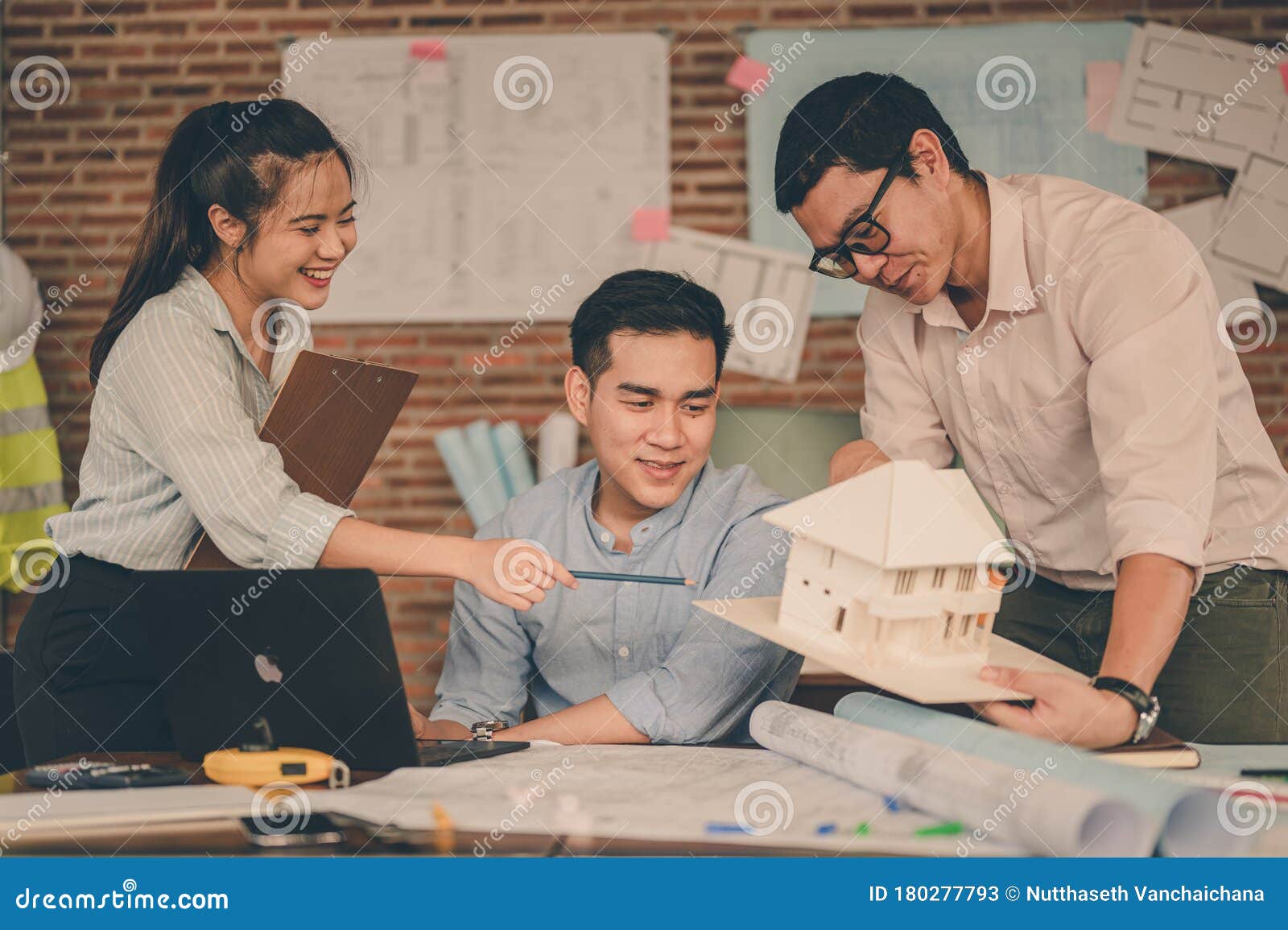 Team of Engineer Discussing of Construction Plan about the House, the ...