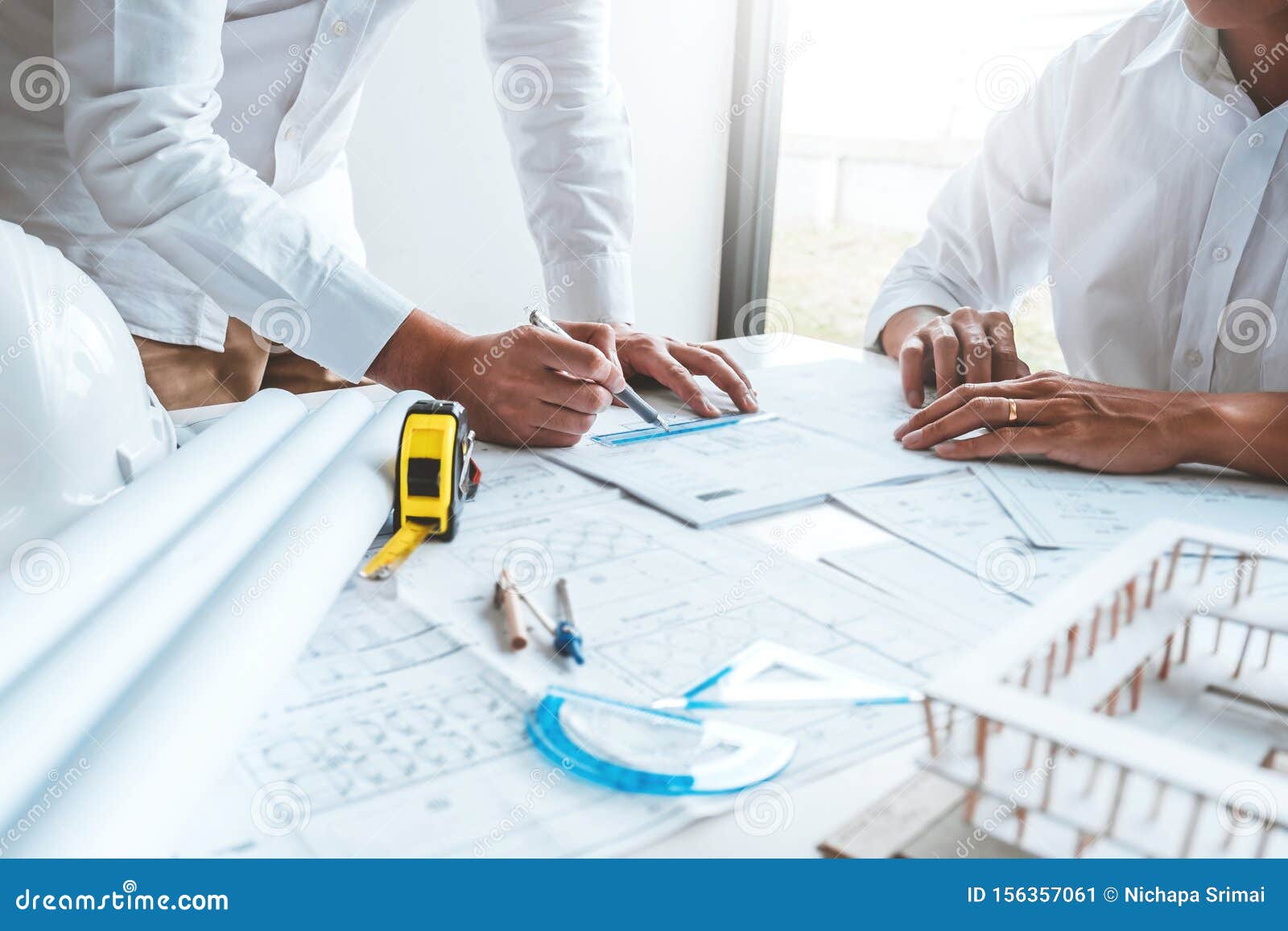 Team Engineer Drawing Graphic Planning and Meeting for Architectural ...