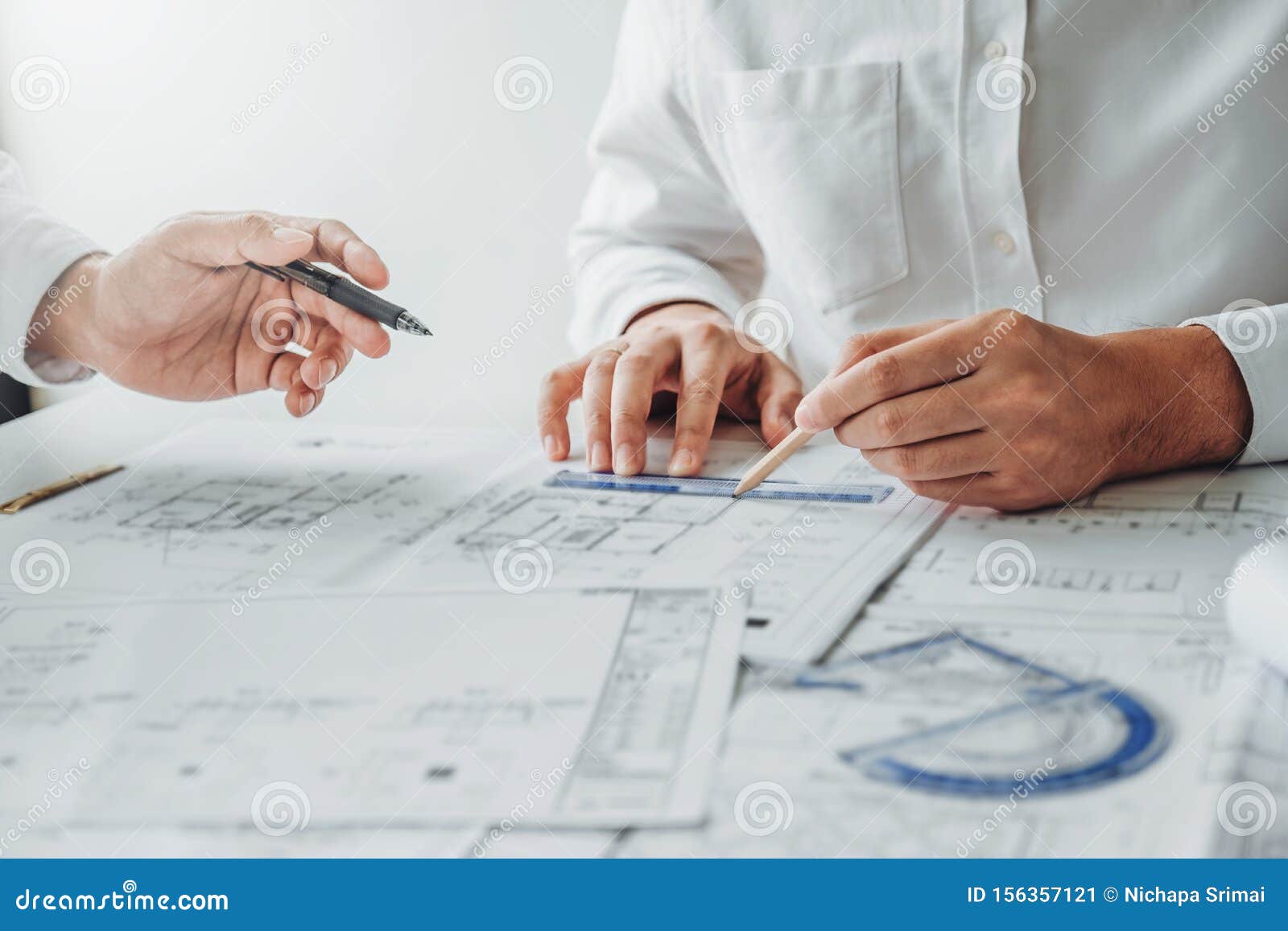 Team Engineer Drawing Graphic Planning and Meeting for Architectural ...