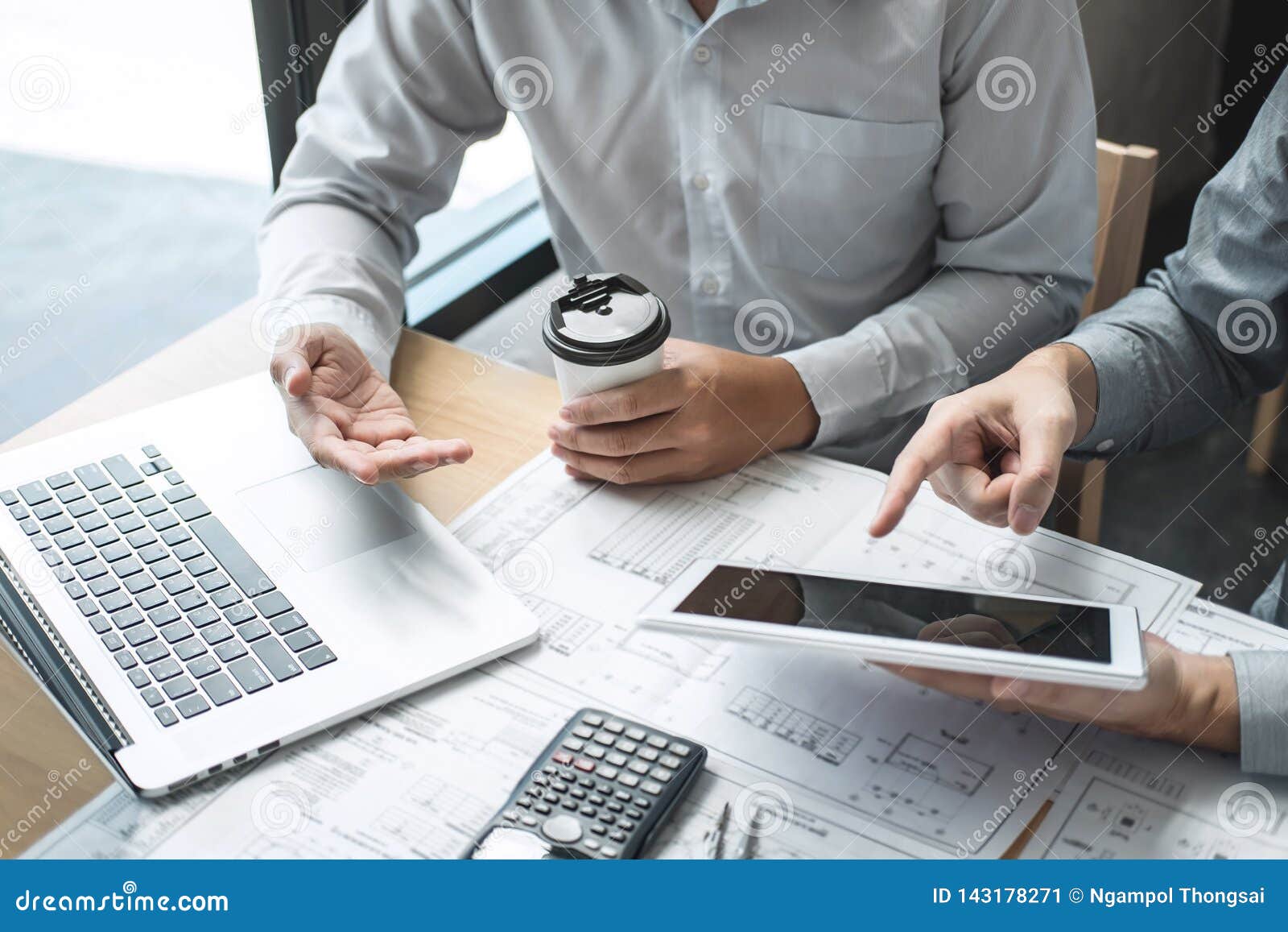 Team of Engineering or Architect Meeting and Discussing on Blueprint ...