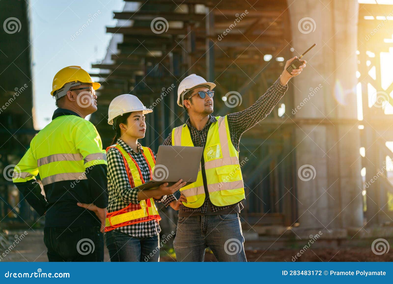 A Team of Engineers and Architects Analyzes Projects Under Construction ...