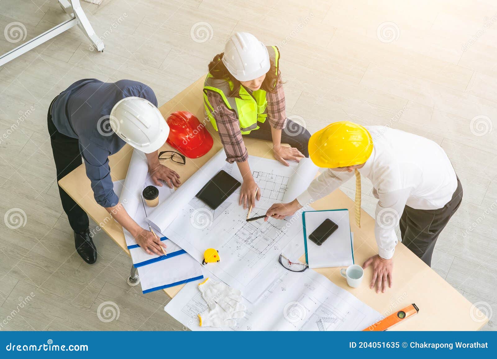 Team of Engineers and Architects Working, Planing, Measuring Layout of ...